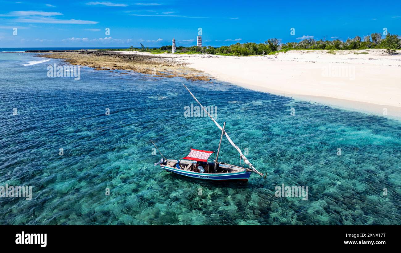 Aerial of a traditional Dhow on a white sand beach, Goa island near the ...