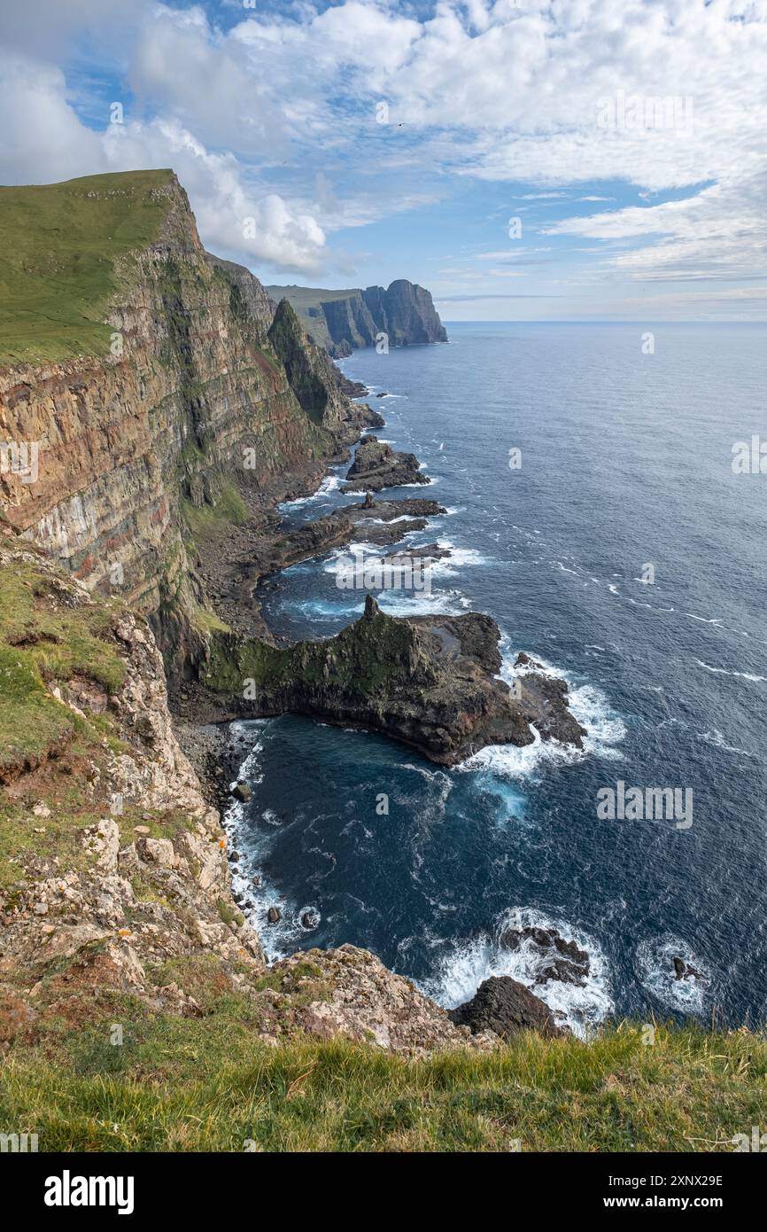 Explore stunning cliffs faroe islands hi-res stock photography and ...