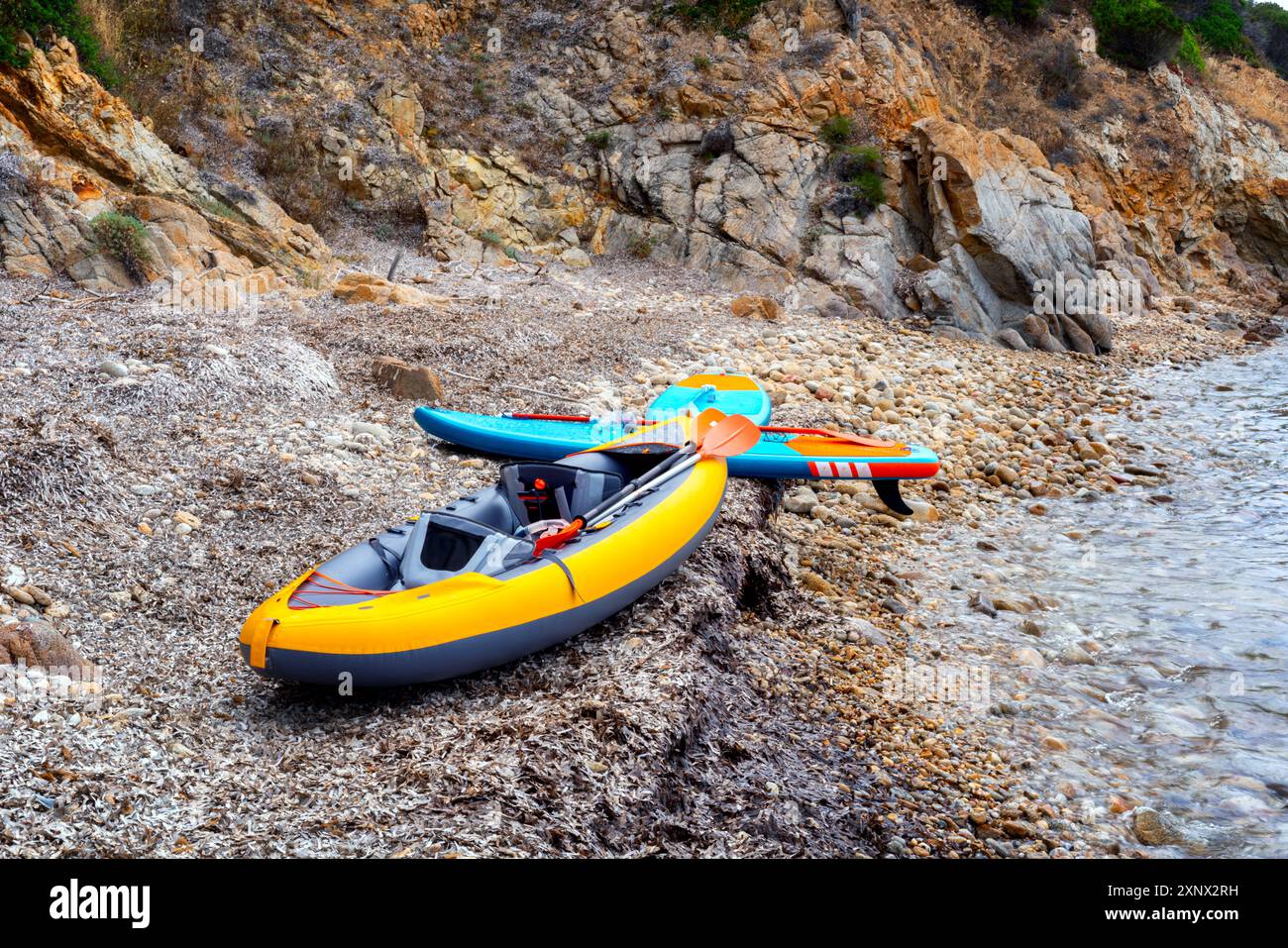 Kayak and paddles on a rocky beach, Sardinia, Italy, Mediterranean ...