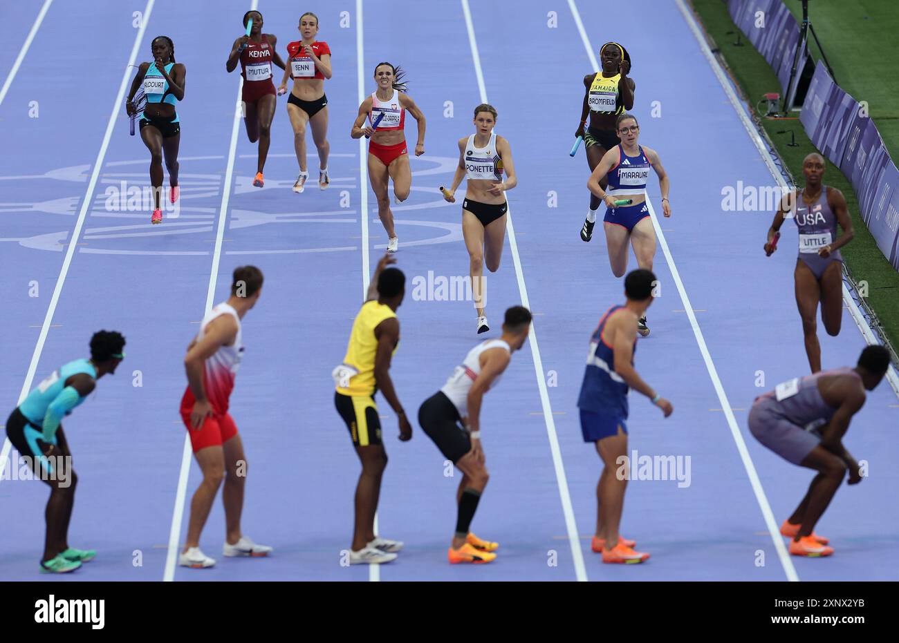 Paris, France. 2nd Aug, 2024. Athletes compete during the 4x400m relay ...