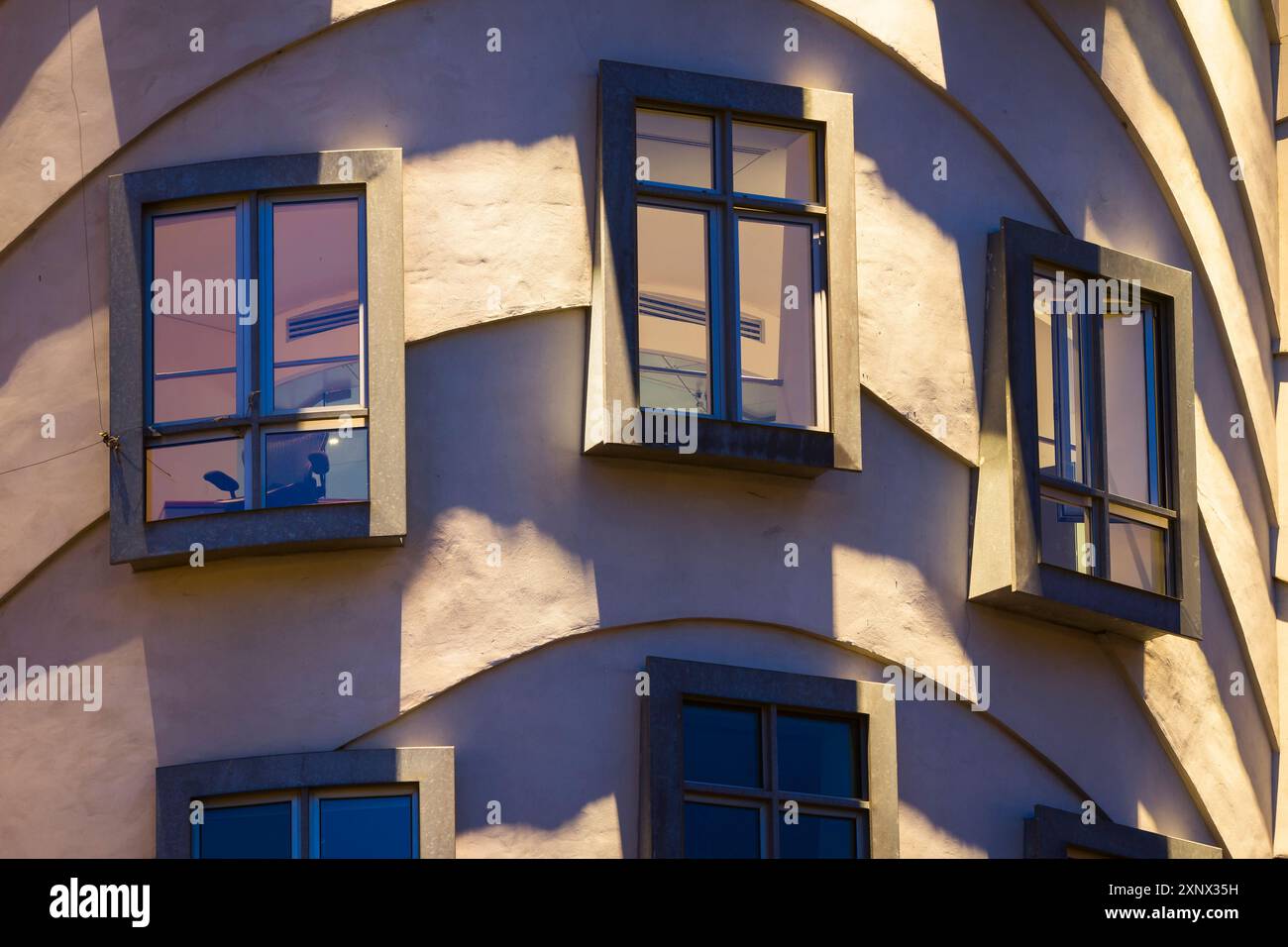 Detail of windows of Dancing House by Frank Gehry at twilight, Prague ...