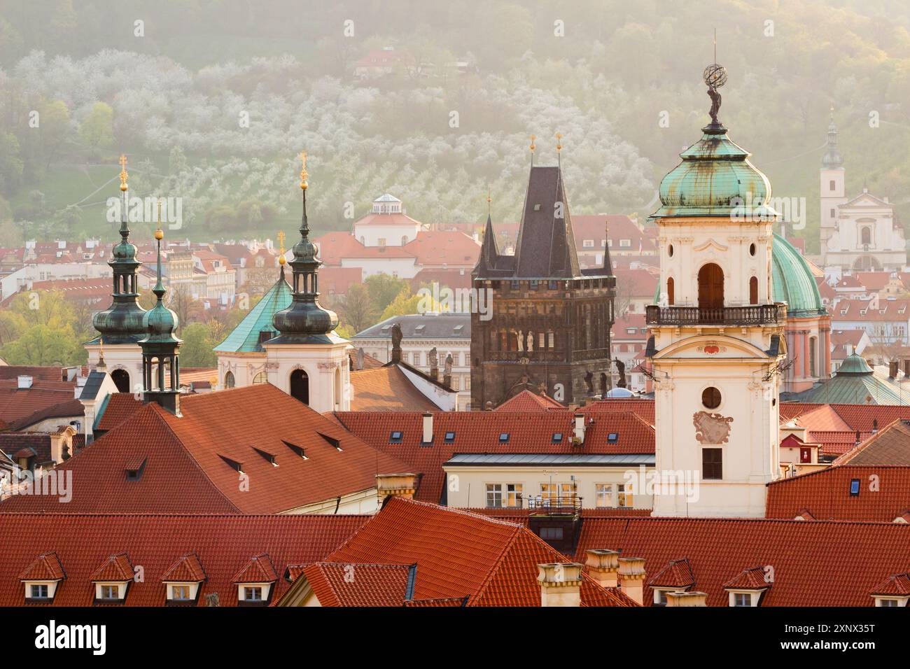 Old Town Bridge Tower and other spires against Petrin Hill, Old Town ...