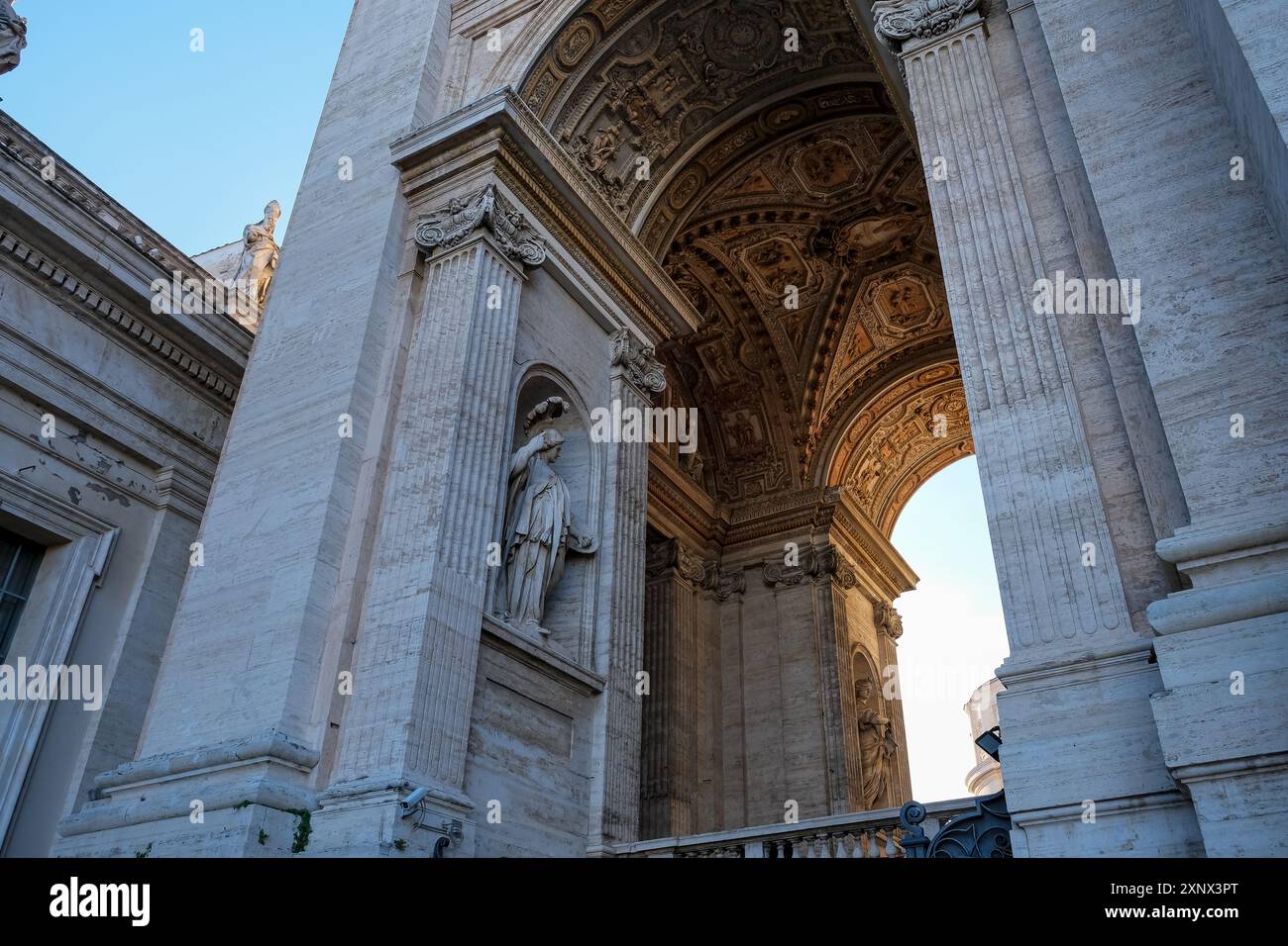 Architectural detail of St. Peter's Basilica, featuring the iconic ...
