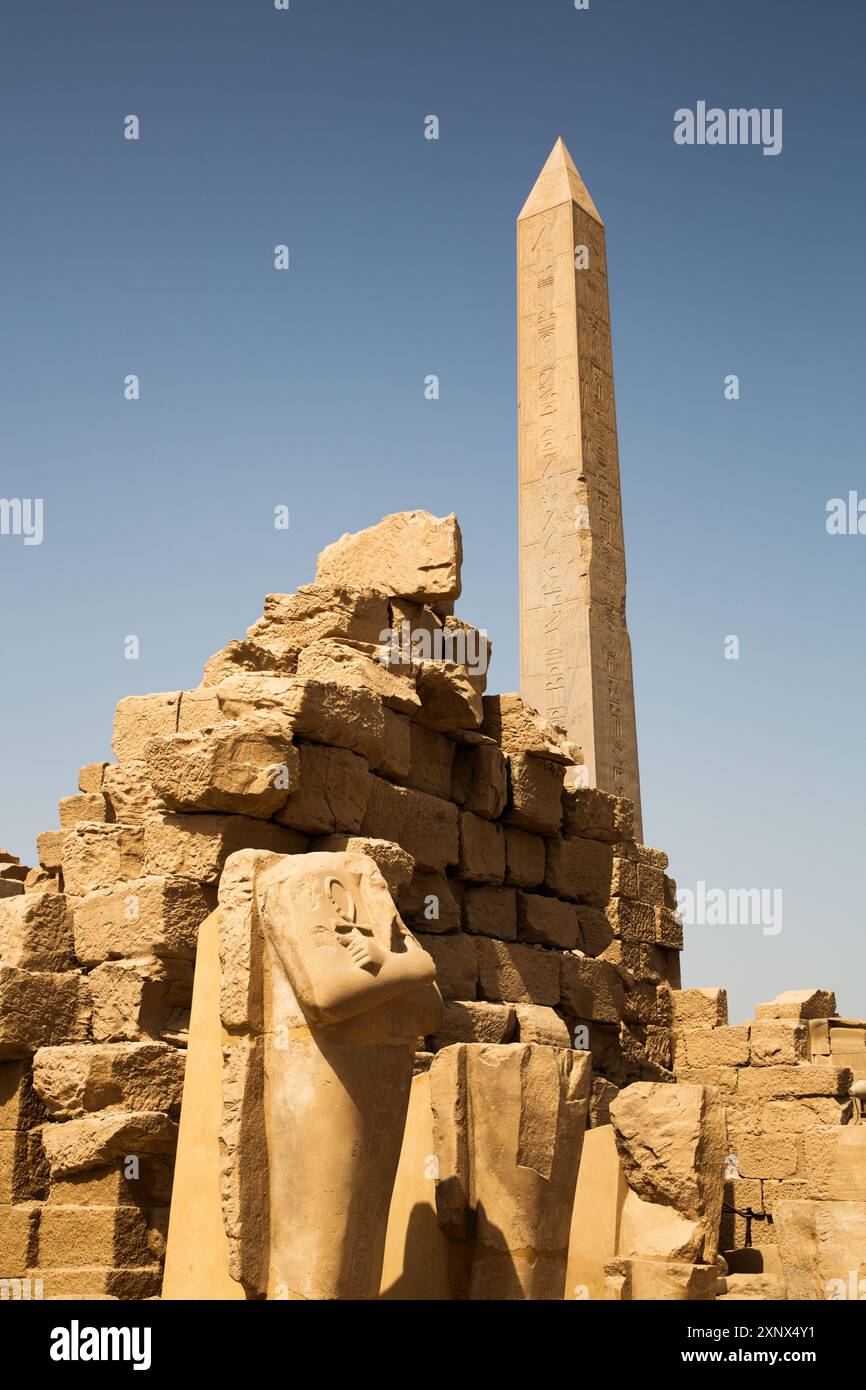 Statues in foreground, Obelisk of Thutmose I, Karnak Temple Complex ...