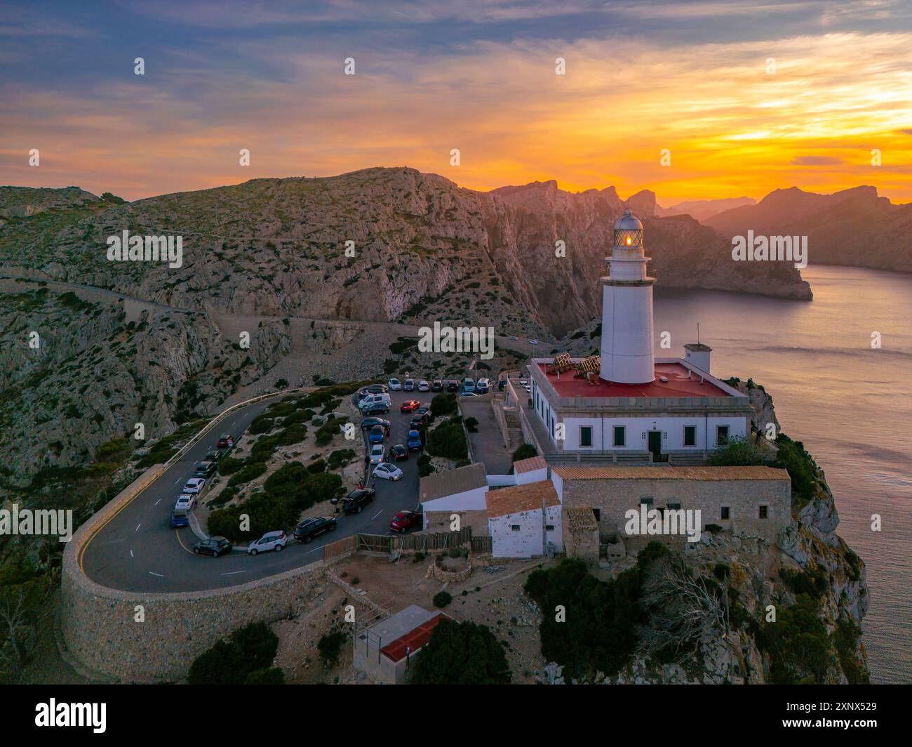 Aerial view of lighthouse at Cap Formentor at sunset, Majorca, Balearic ...