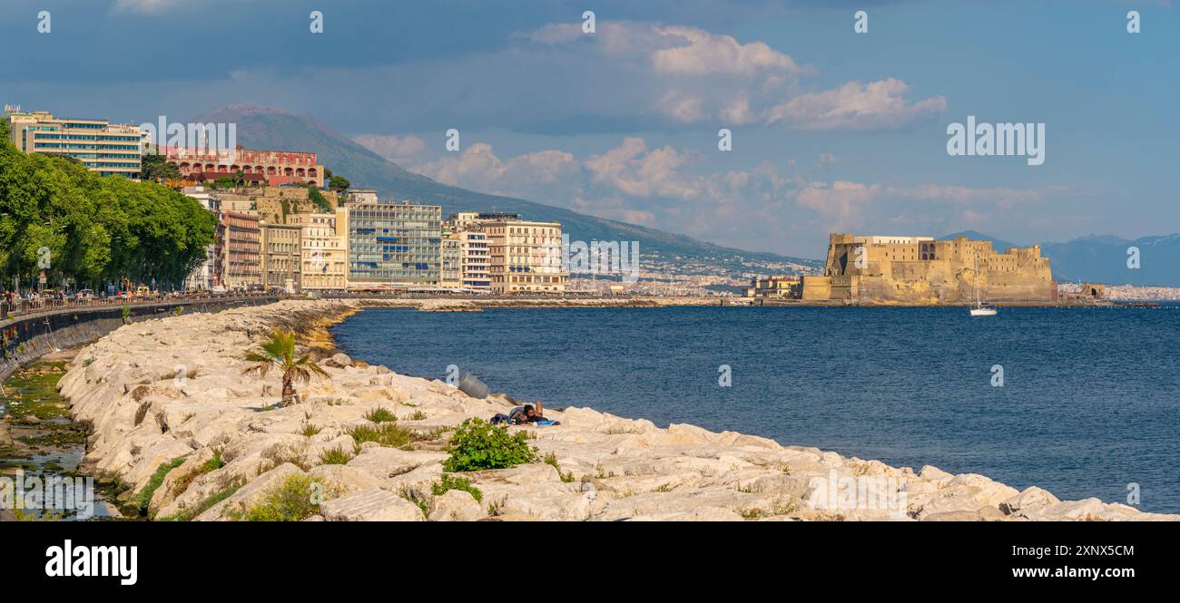 View of pastel coloured architecture, restaurants and Ovo Castle on ...