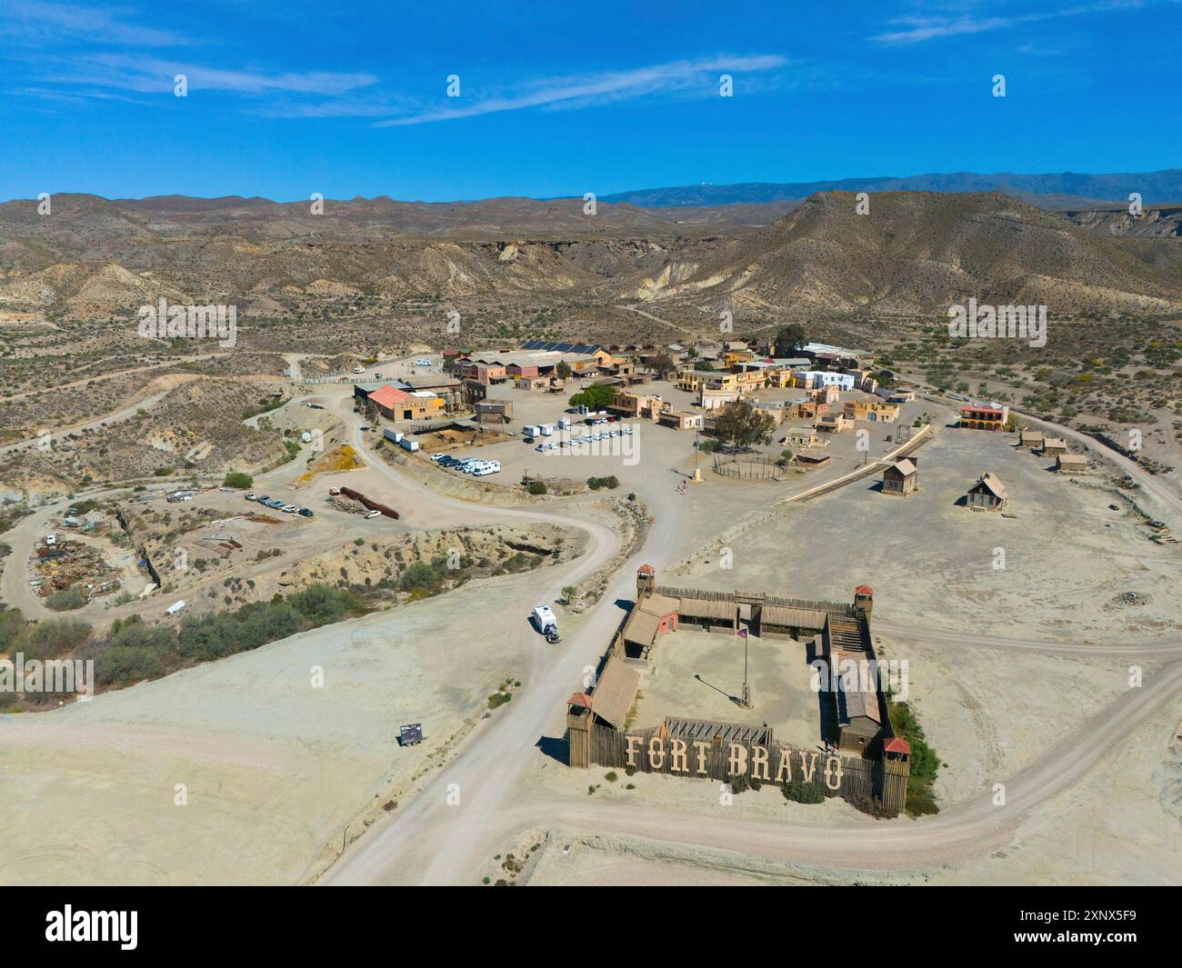 Aerial view of a desert landscape with Fort Bravo, buildings and roads ...