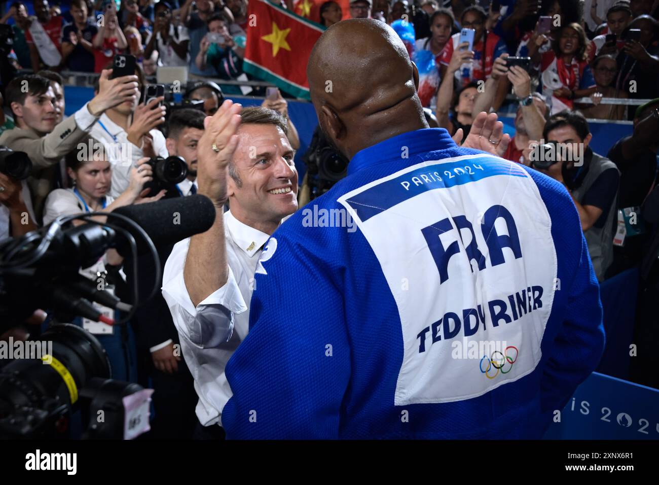 Teddy Riner ( FRA ) Gold medal celebrates with Emmanuel Macron ( French ...