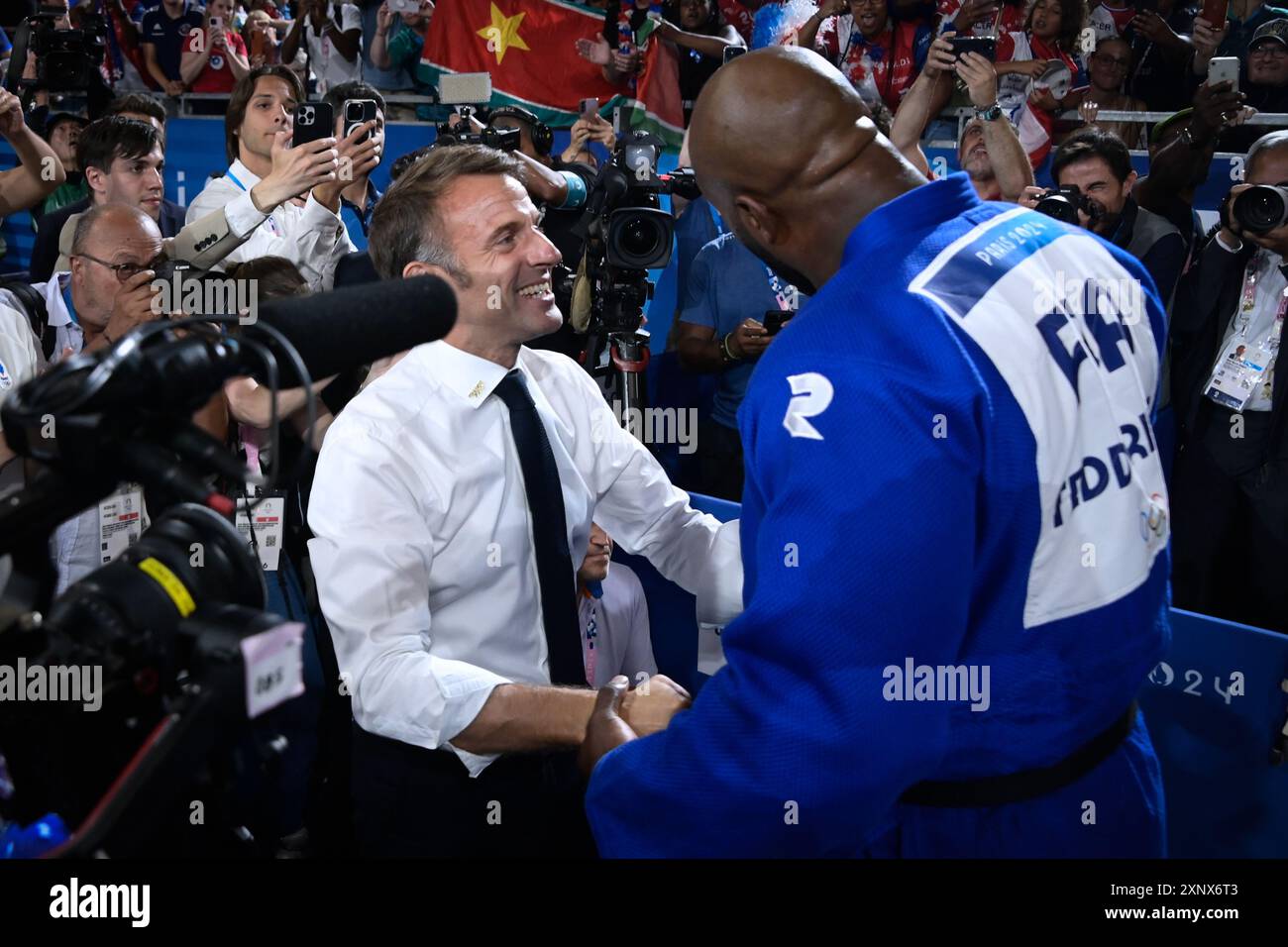 Teddy Riner ( FRA ) Gold medal celebrates with Emmanuel Macron ( French ...