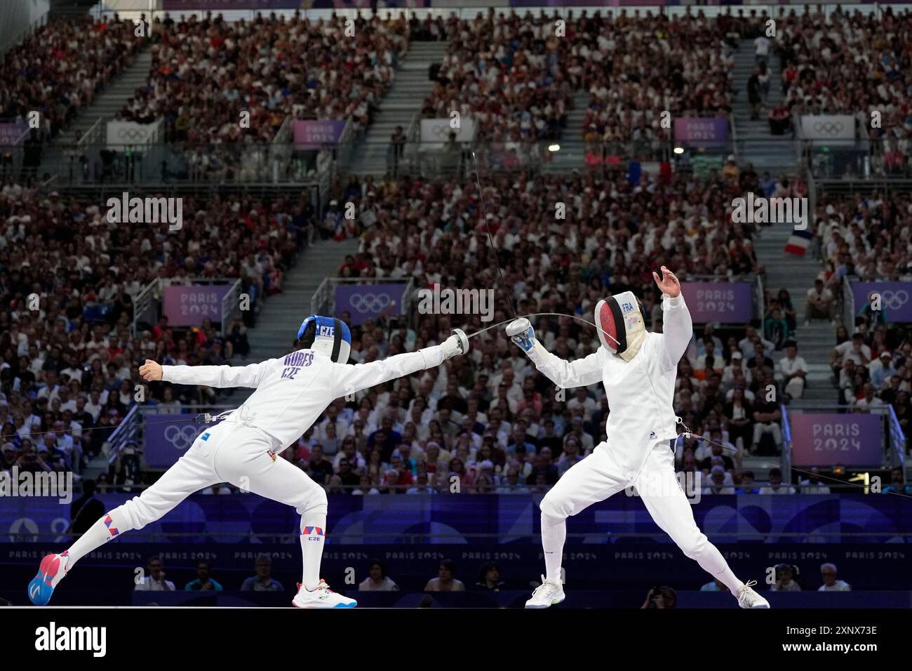 Czech Republic's Martin Rubes, left, competes with France's Paul ...