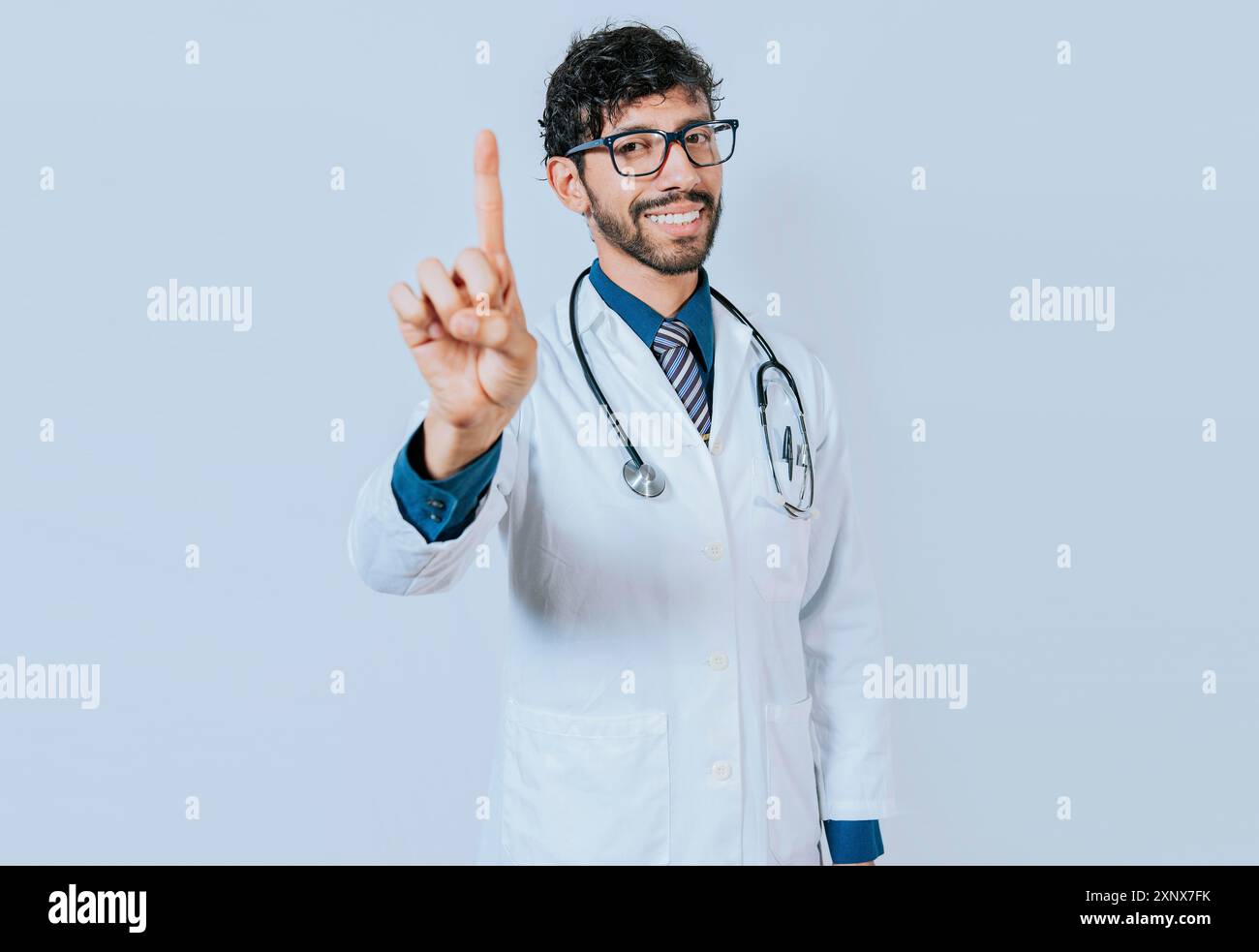 Doctor counting number ONE isolated. Handsome doctor counting number 1 ... Doctor counting number ONE isolated. Handsome doctor counting number 1 ...