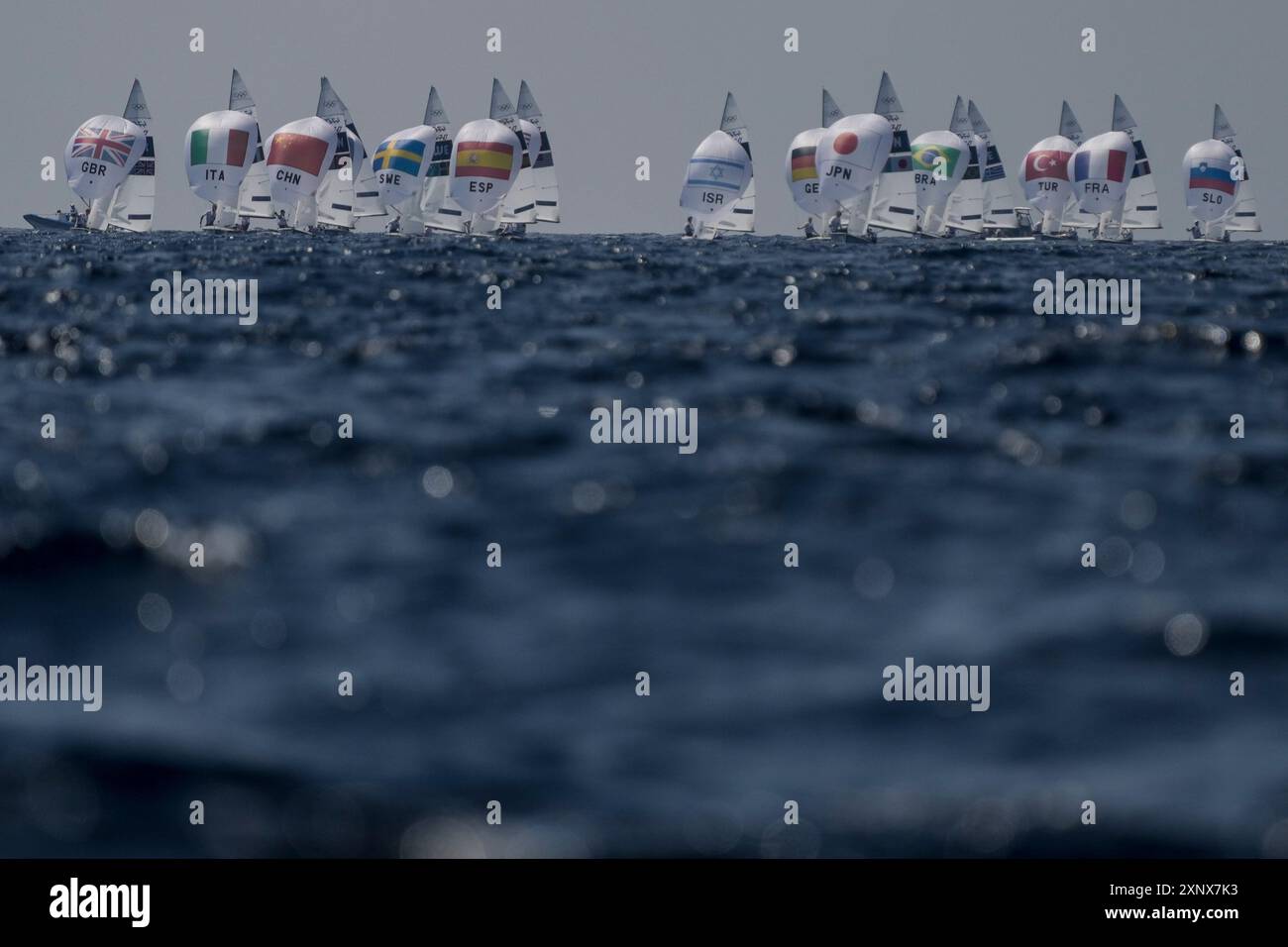 Boats are lined up during a mixed dinghy race, at the 2024 Summer ...