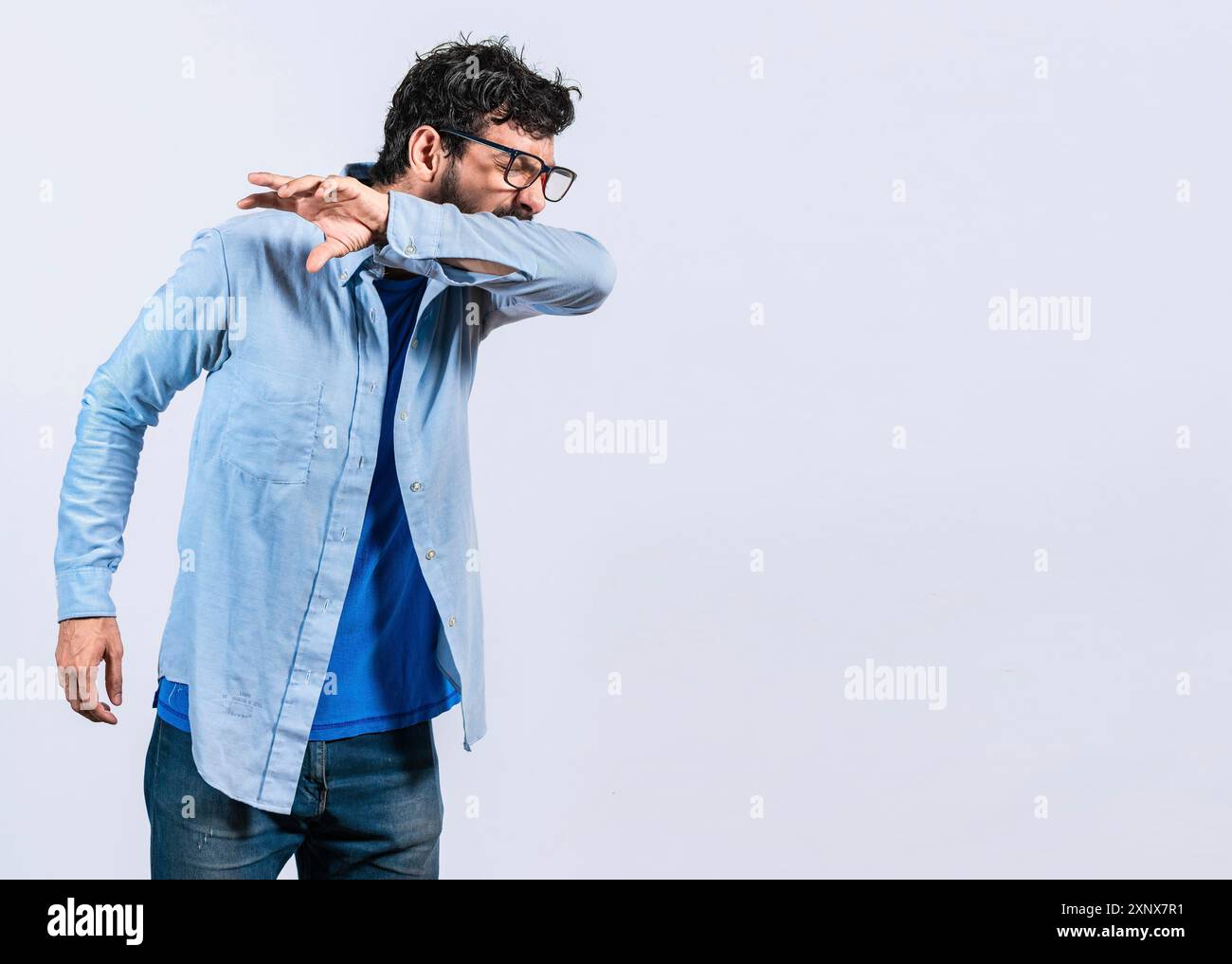 Coughing or sneezing into your elbow hi-res stock photography and ...