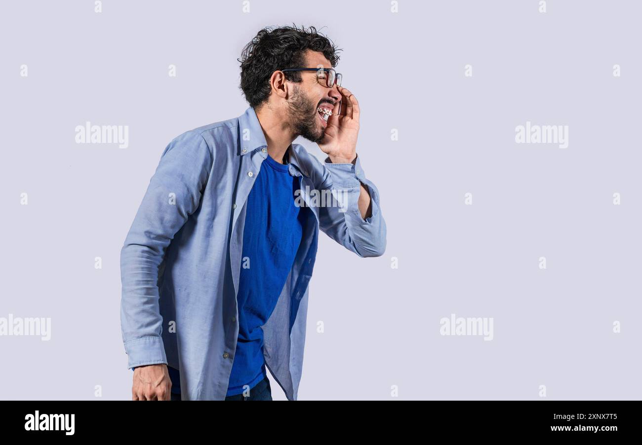 Side view of a man shouting out loud isolated. Person announcing and ...