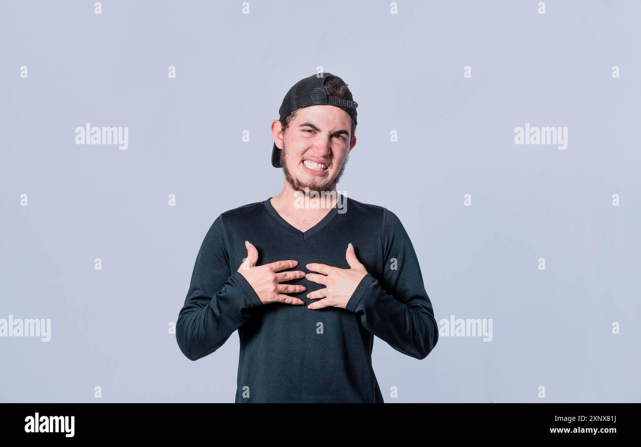 Guy with disgust expression, man with disgust expression with hands on ...