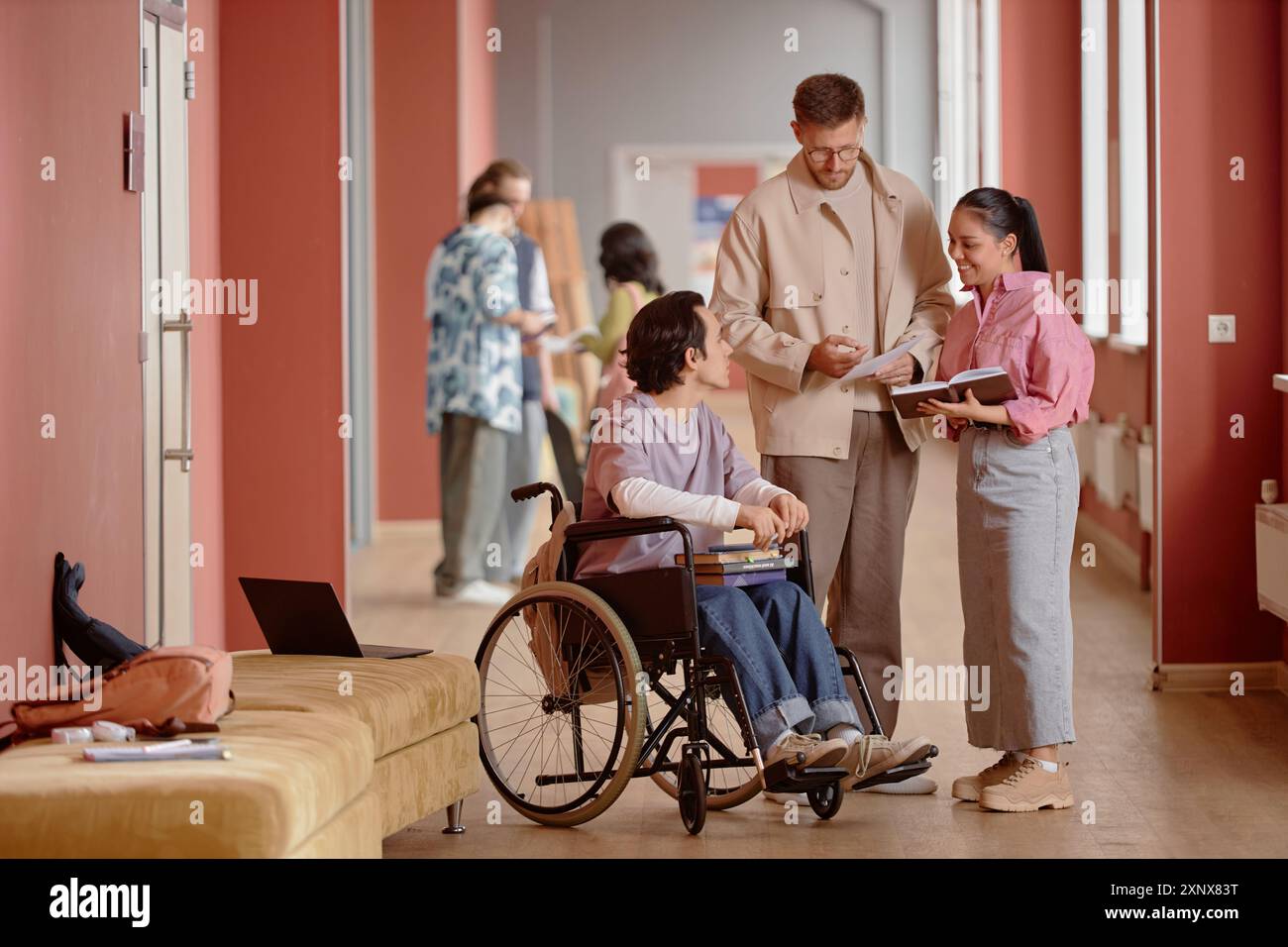 Adult male professor answering question in friendly informal ...