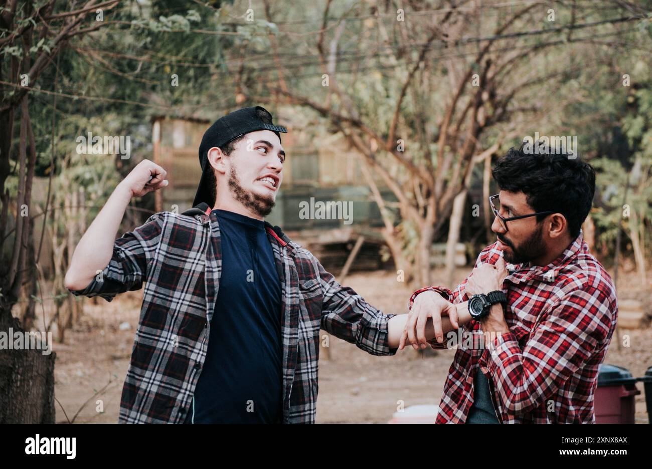 Concept of two men fighting, man threatening another man, concept of ...