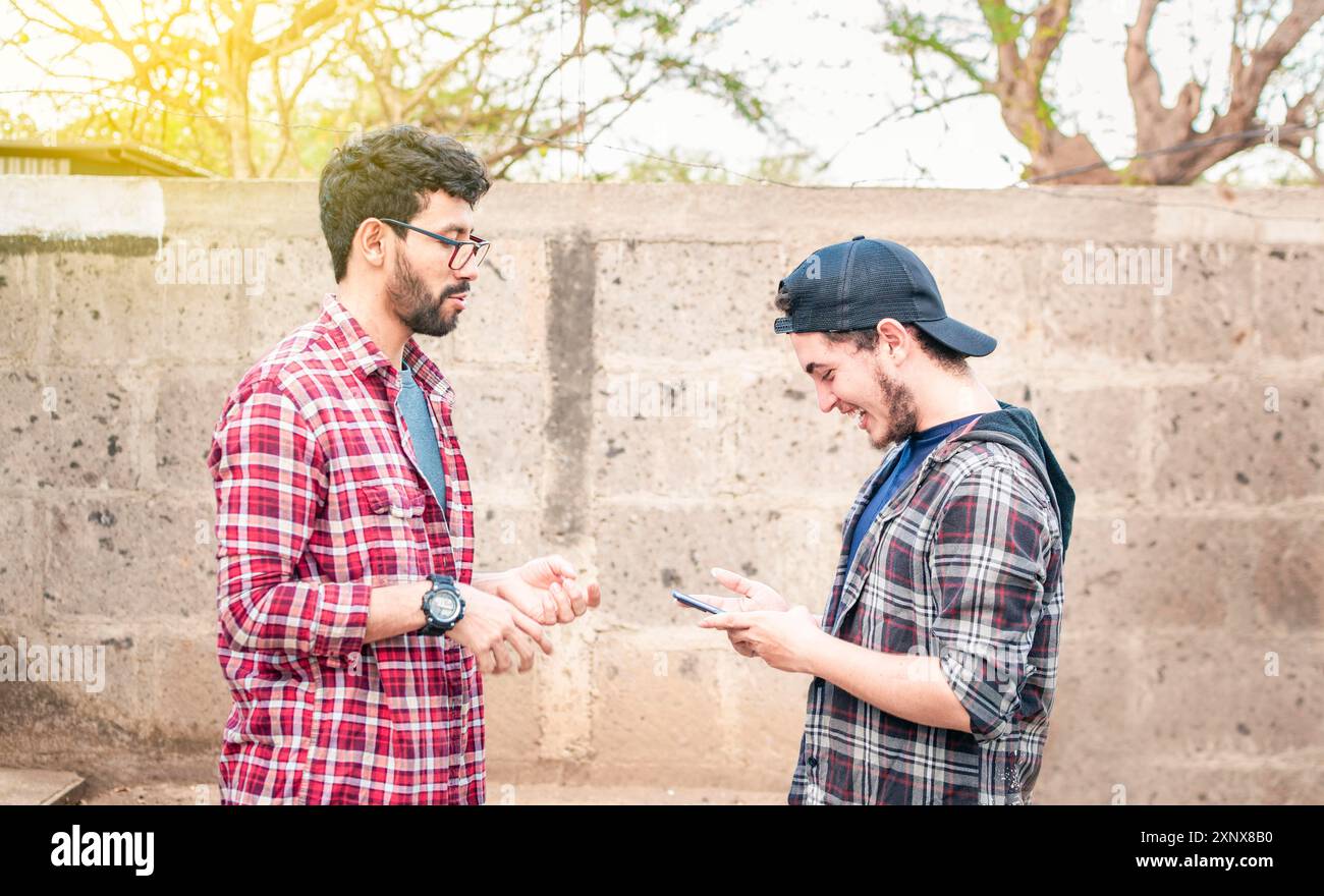 Hispanic teenagers male two speak hi-res stock photography and images ...