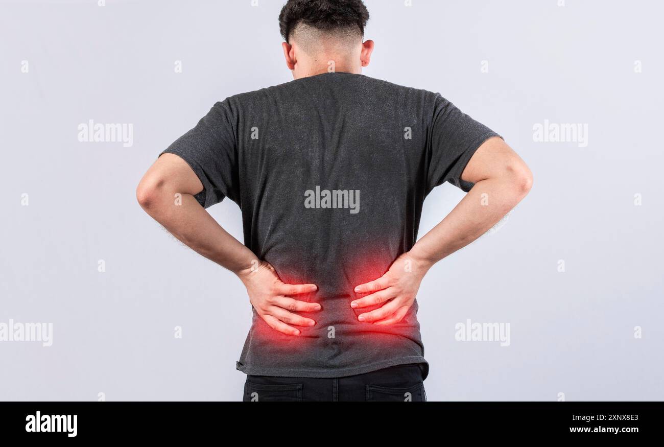 Lumbar problems concept, Sore man with back pain isolated. Man with ...