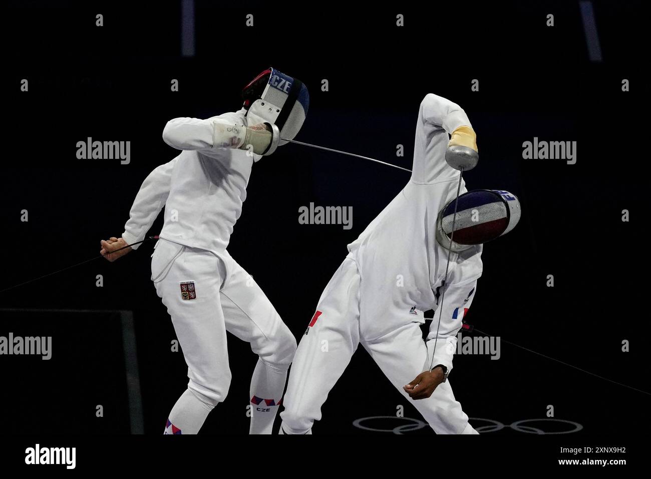 Czech Republic's Jiri Beran, left, competes with France's Yannik Borel ...