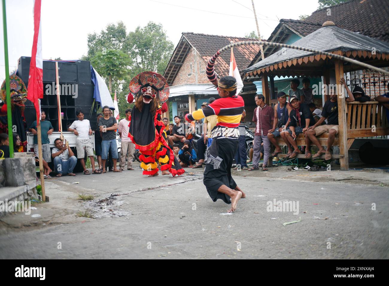 The traditional Barong dance is being performed in Sukomoro village ...