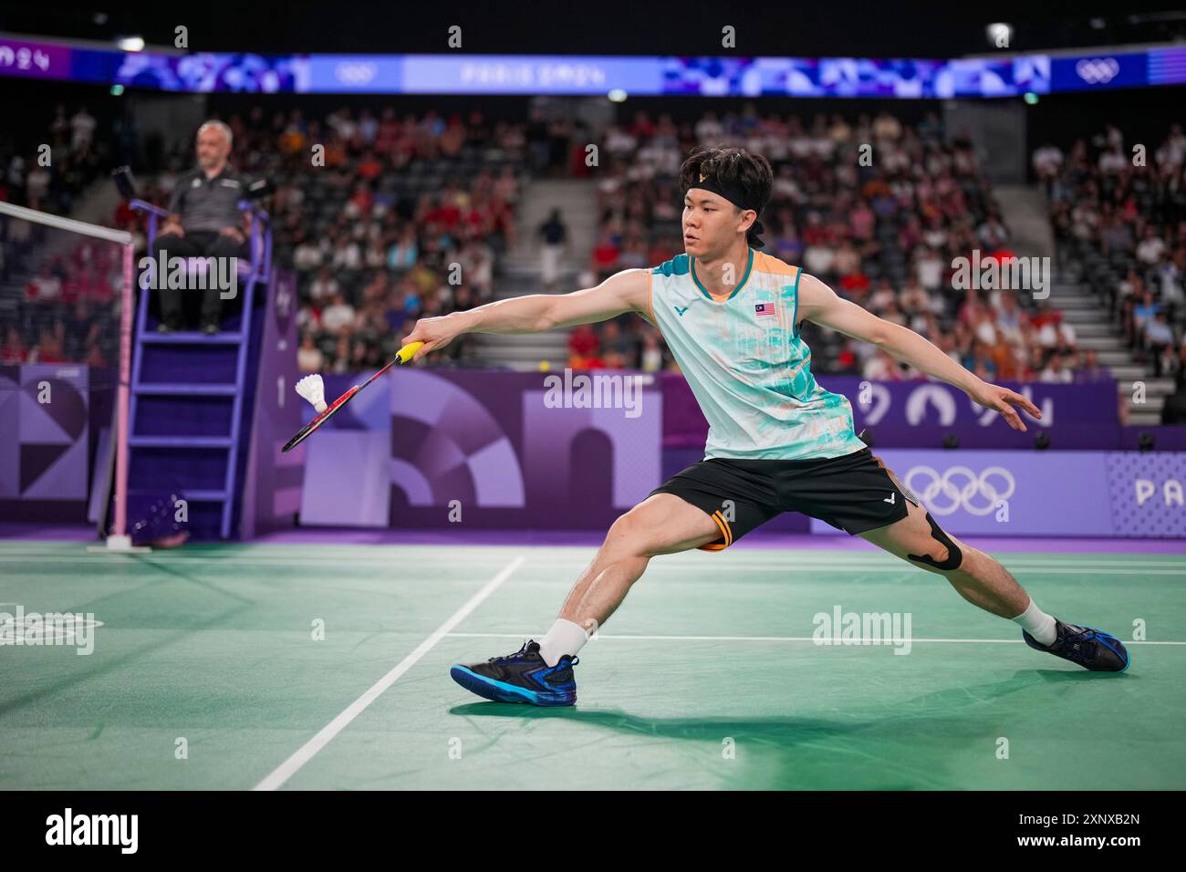 Malaysia's Lee Zii Jia plays against Denmark's Anders Antonsen during ... Malaysia's Lee Zii Jia plays against Denmark's Anders Antonsen during ...