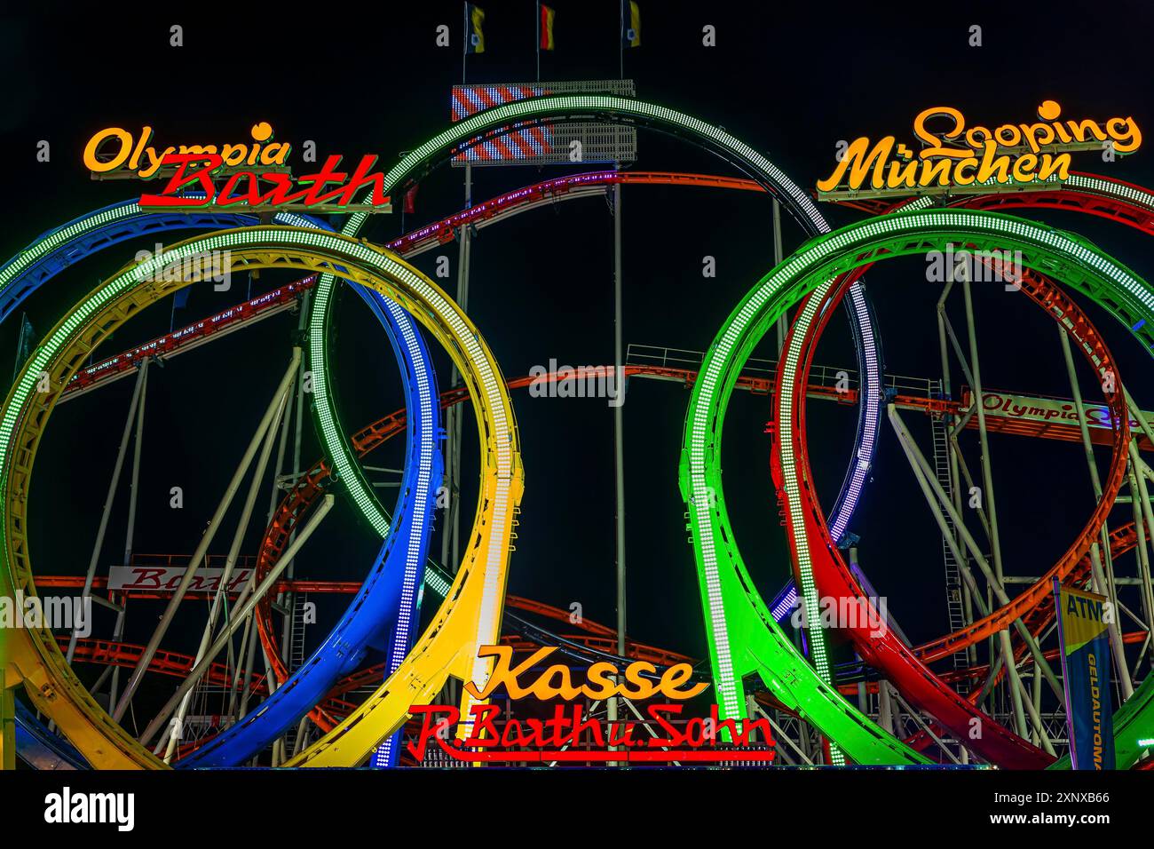 Illuminated Olympia five-loop, roller coaster, night shot, Oktoberfest ...