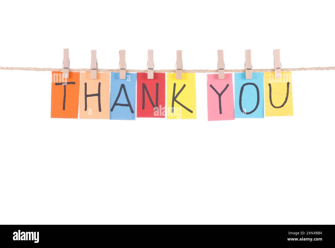 Thank you, paper words card hang by wooden peg Stock Photo - Alamy