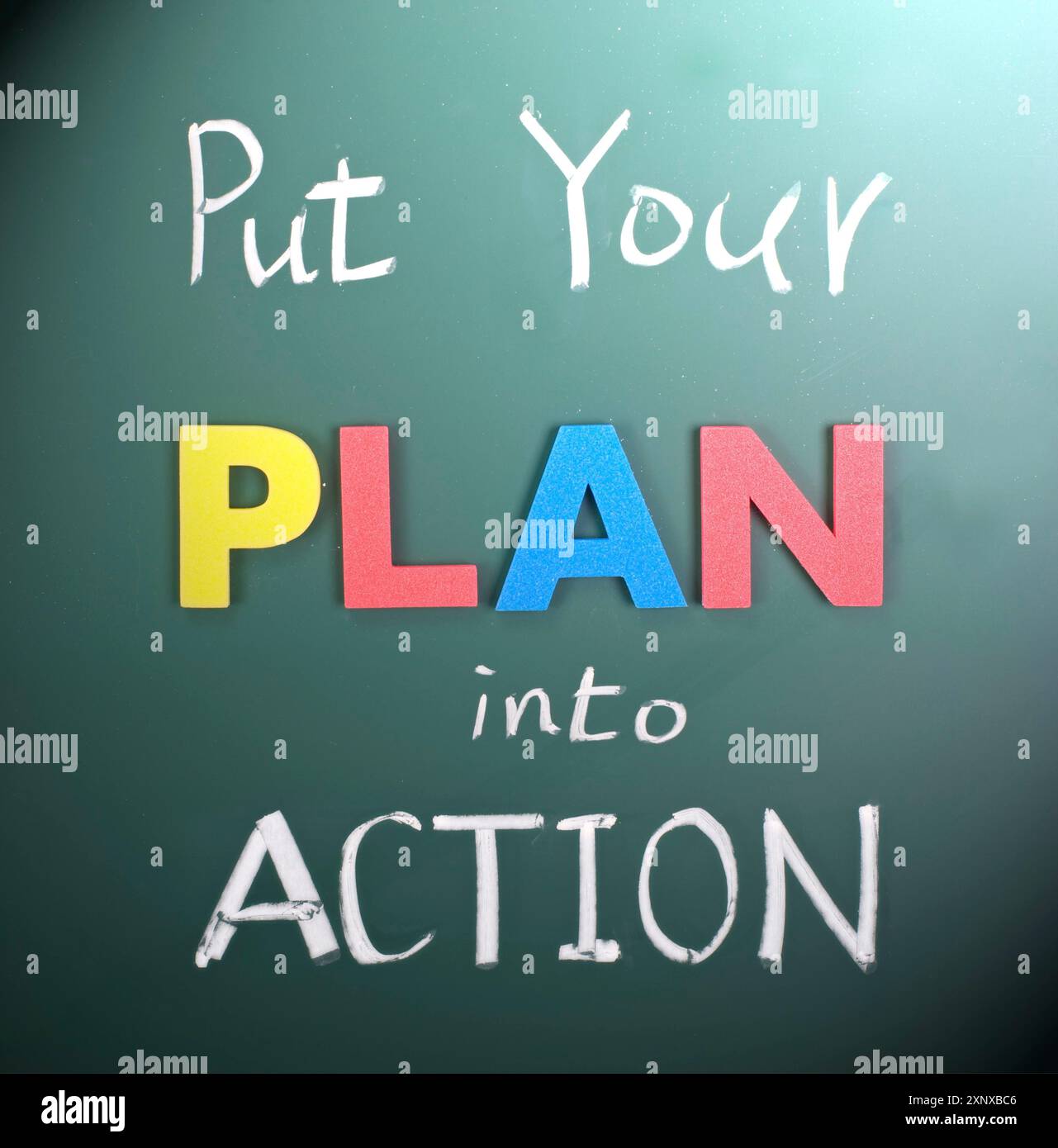 Put your plan into action, words on blackboard Stock Photo - Alamy