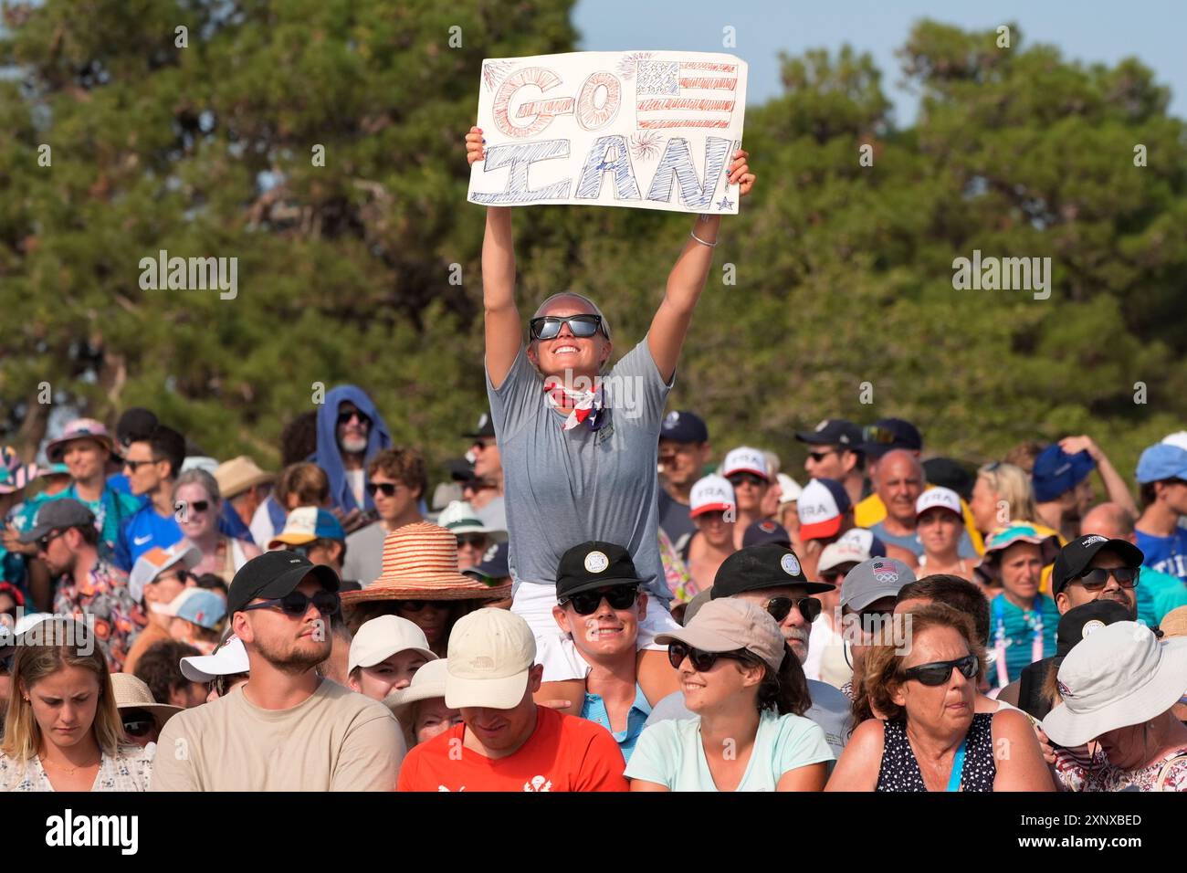A sailing fan cheers on Olympic bronze medalist Ian Barrows of the ...