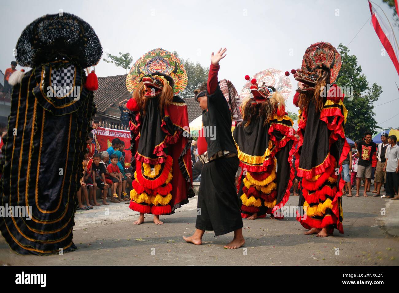 The traditional Barong dance is being performed in Sukomoro village ...