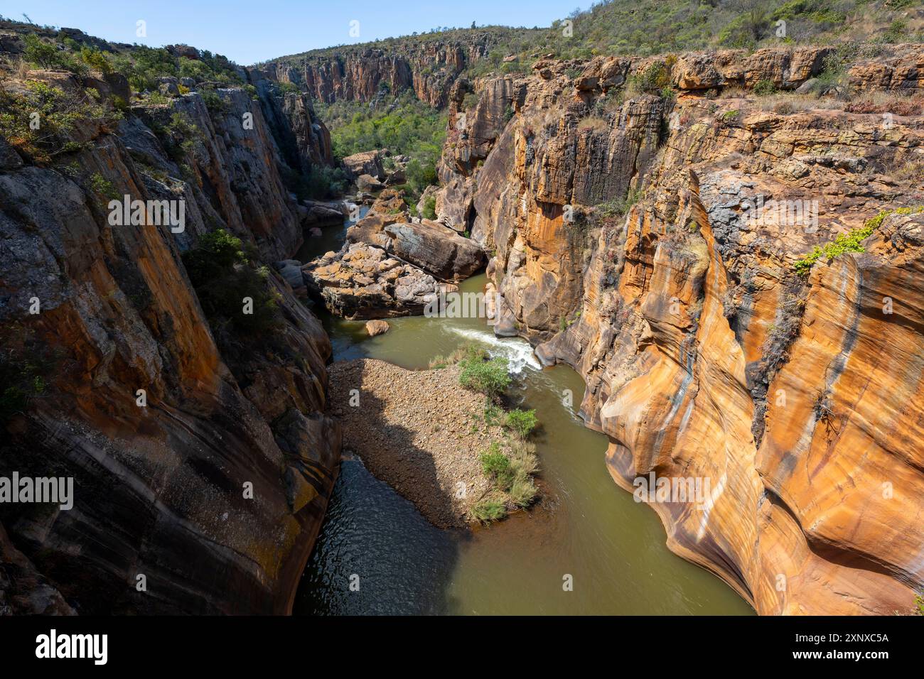 Canyon with steep orange-coloured cliffs with the Blyde River, Bourke's ...