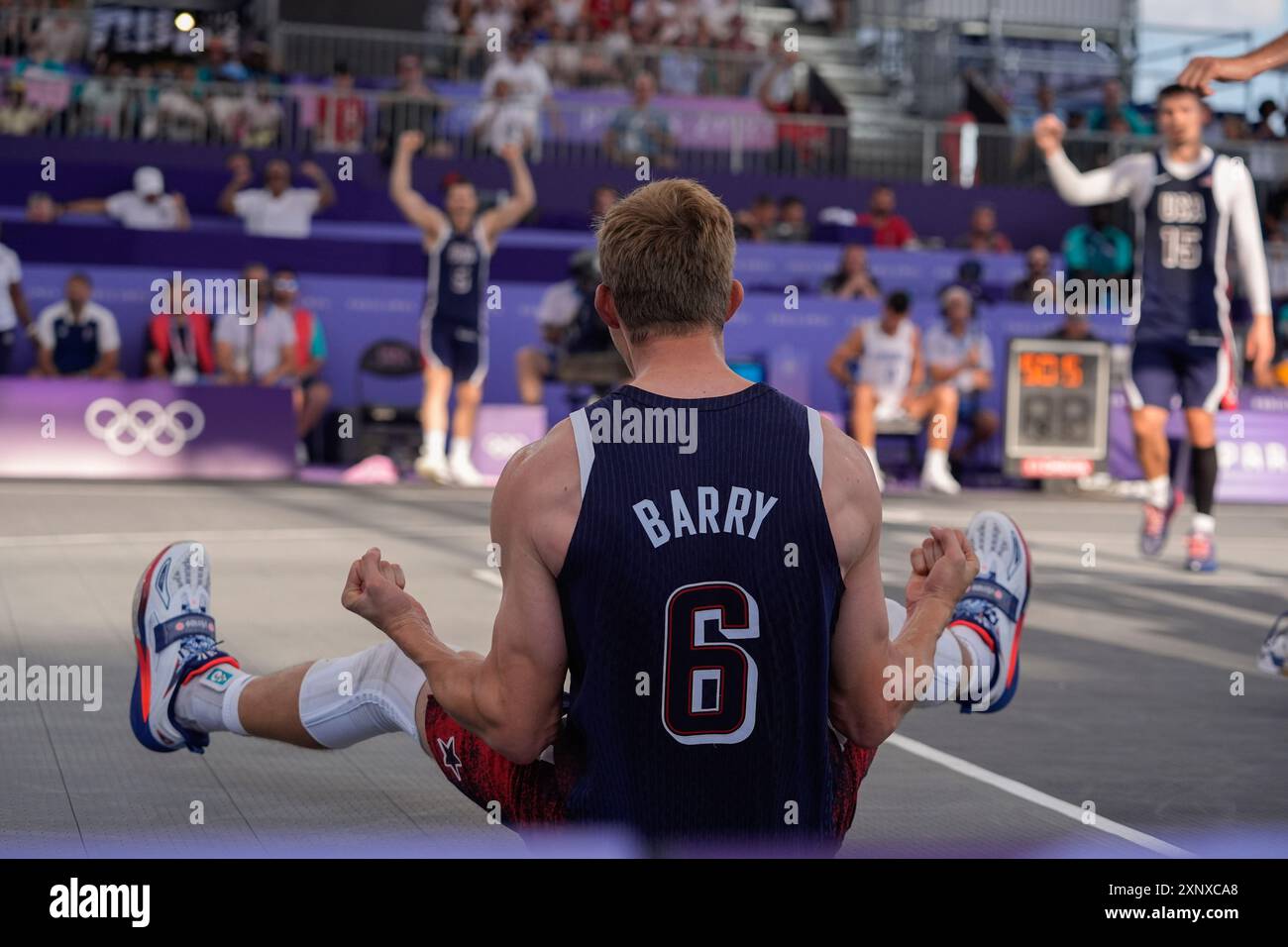 Canyon Barry (6), of the United States, celebrates with teammates after ...