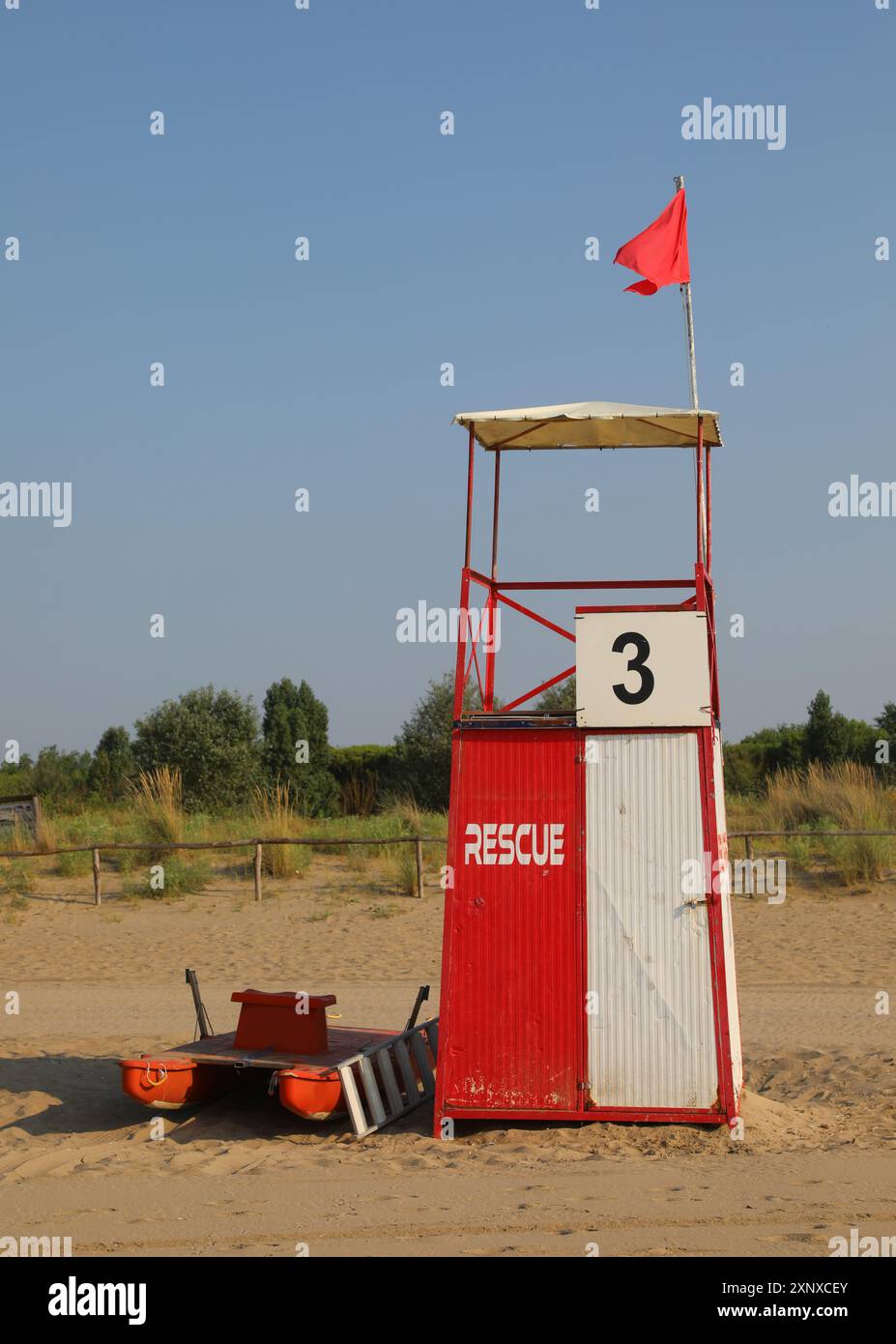 red flag in the tower used by lifeguards on the beach to keep an eye on ...