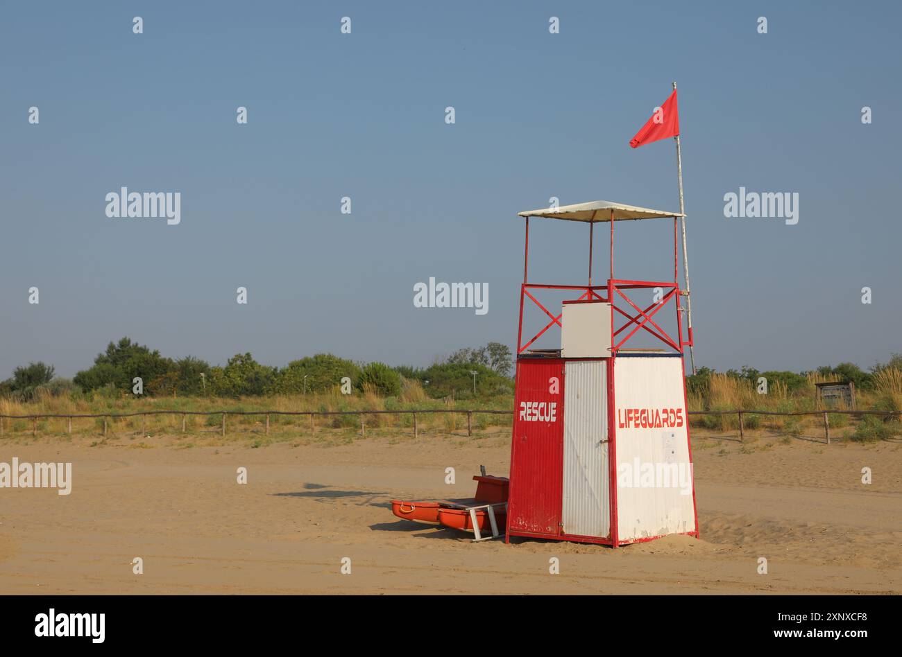 tower used by lifeguards on the beach to keep an eye on swimmers and ...