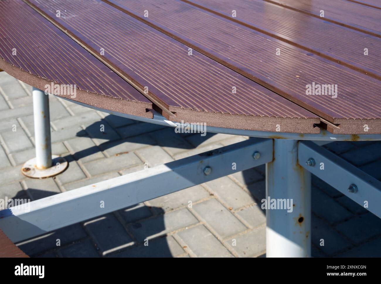 Plastic decking board as a table top for a street cafe table Stock ...