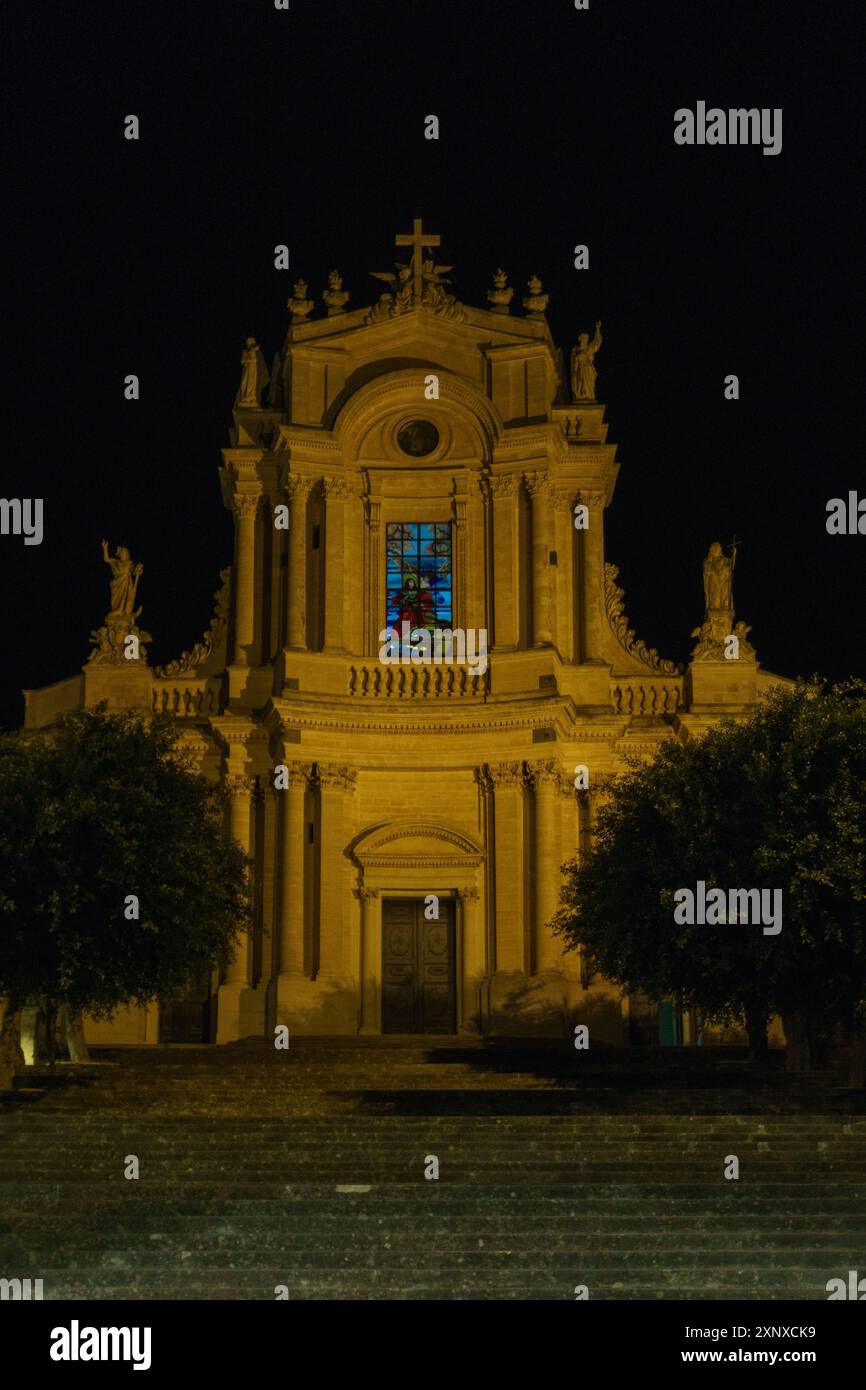 Illuminated facade of the beautiful sicilian baroque church Chiesa di ...