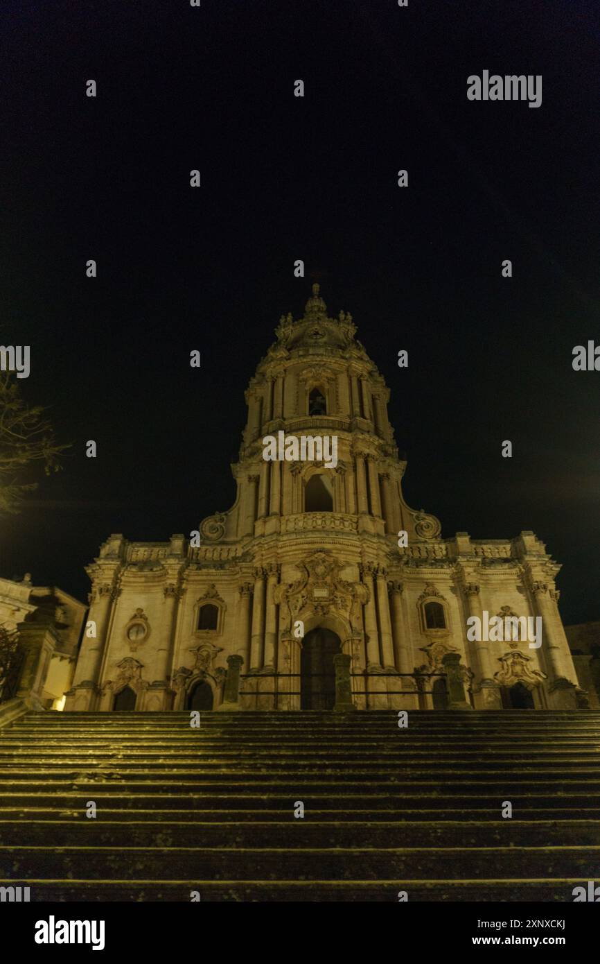 Illuminated facade of the beautiful sicilian baroque church Duomo of ...