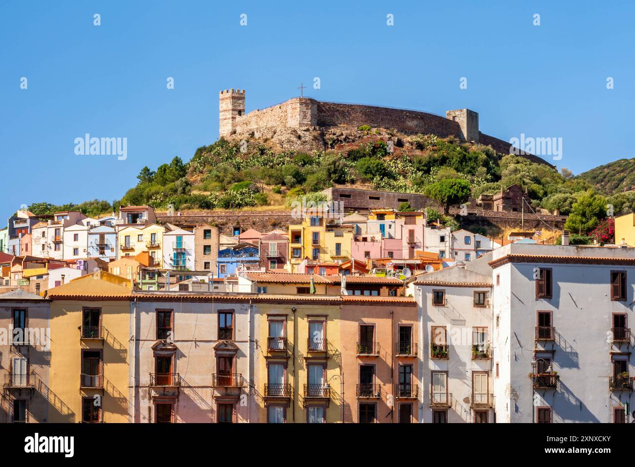 Bosa city colorful buildings with castle on top of the hill and Vecchio ...
