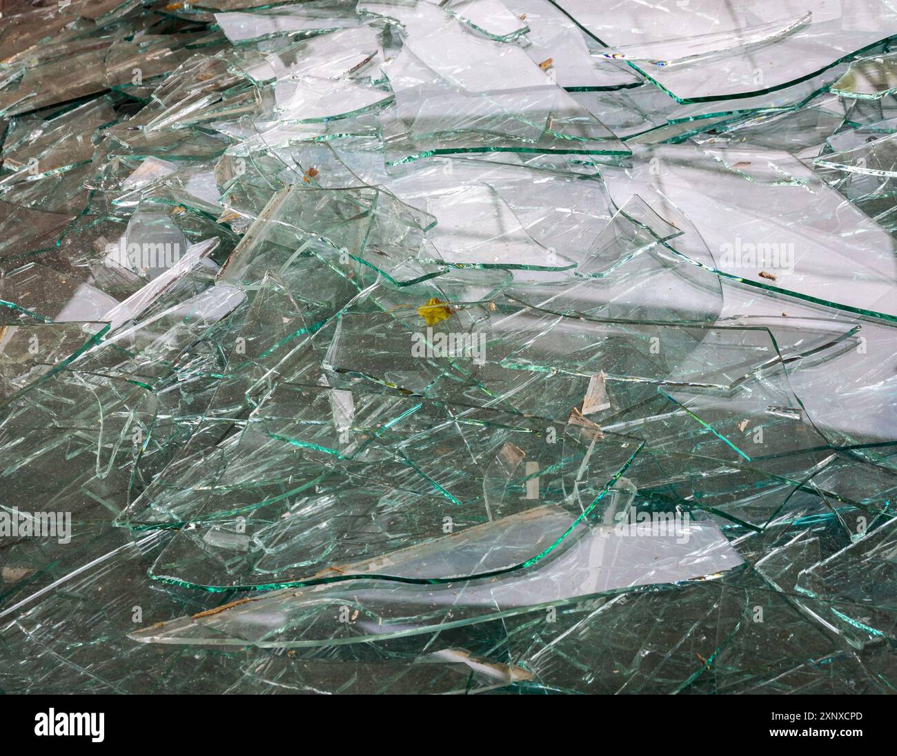 Broken window glass collected for recycling Stock Photo - Alamy