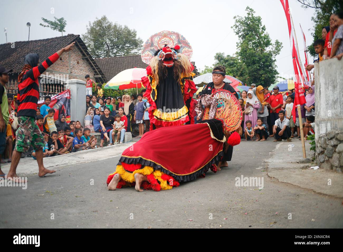 The traditional Barong dance is being performed in Sukomoro village ...