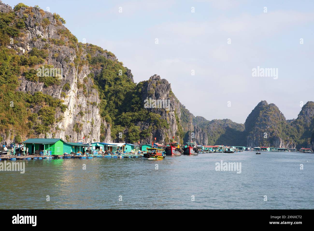 The floating fishing village of Cai Beo and the karst rocks in Lan Ha ...