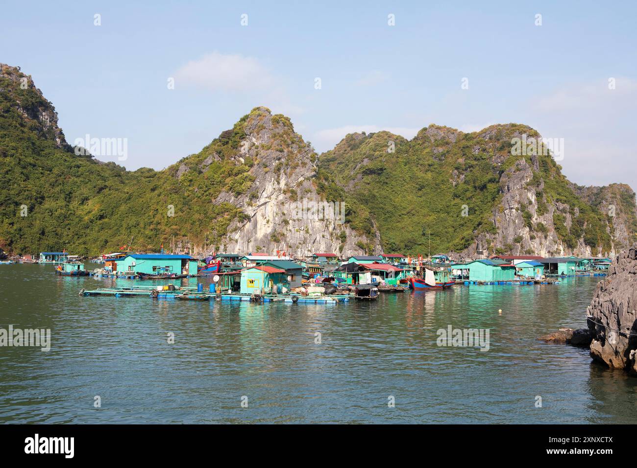 The floating fishing village of Cai Beo and the karst rocks in Lan Ha ...