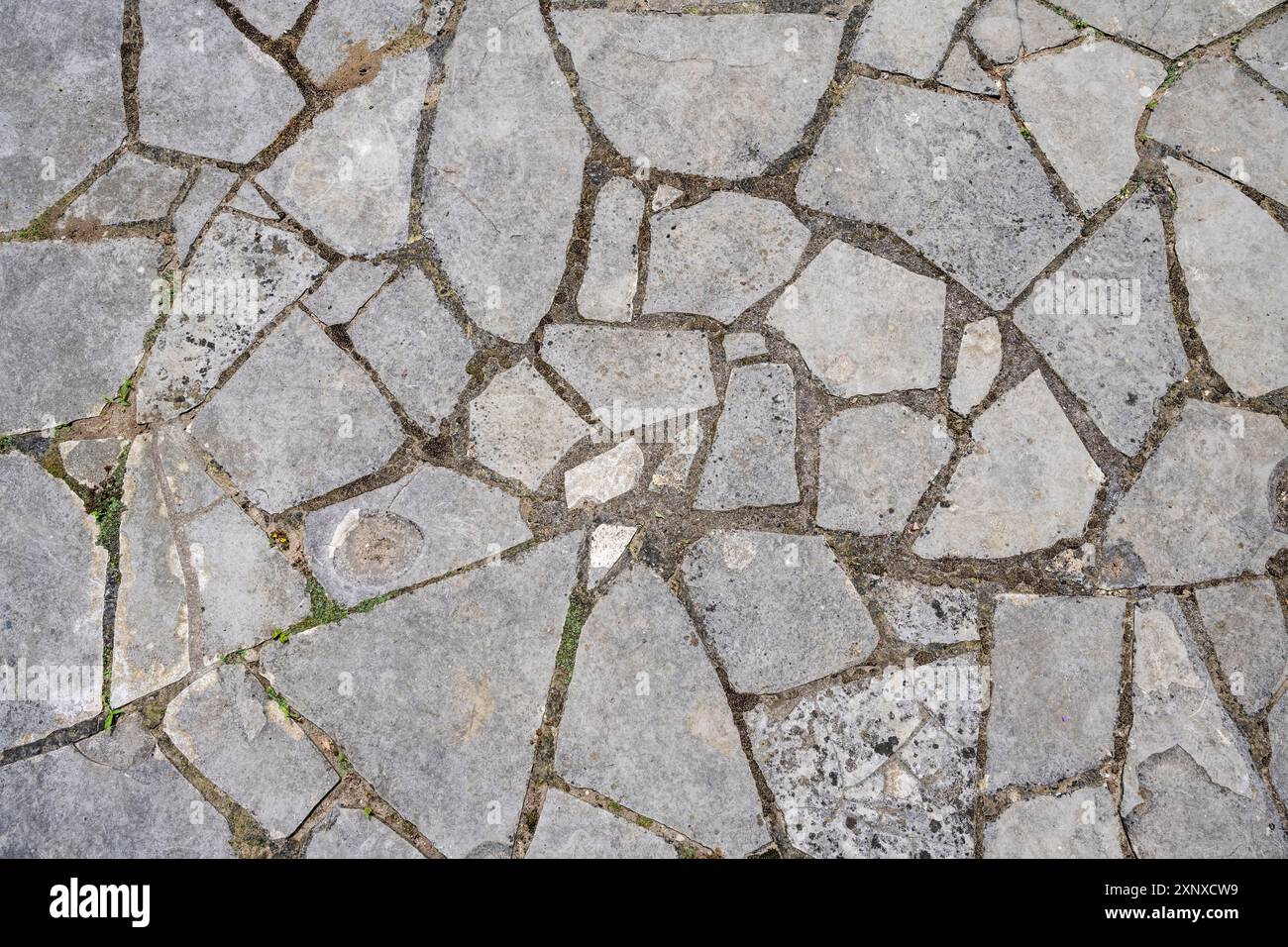 Mosaic of stone slabs on a garden terrace, full-size Stock Photo - Alamy