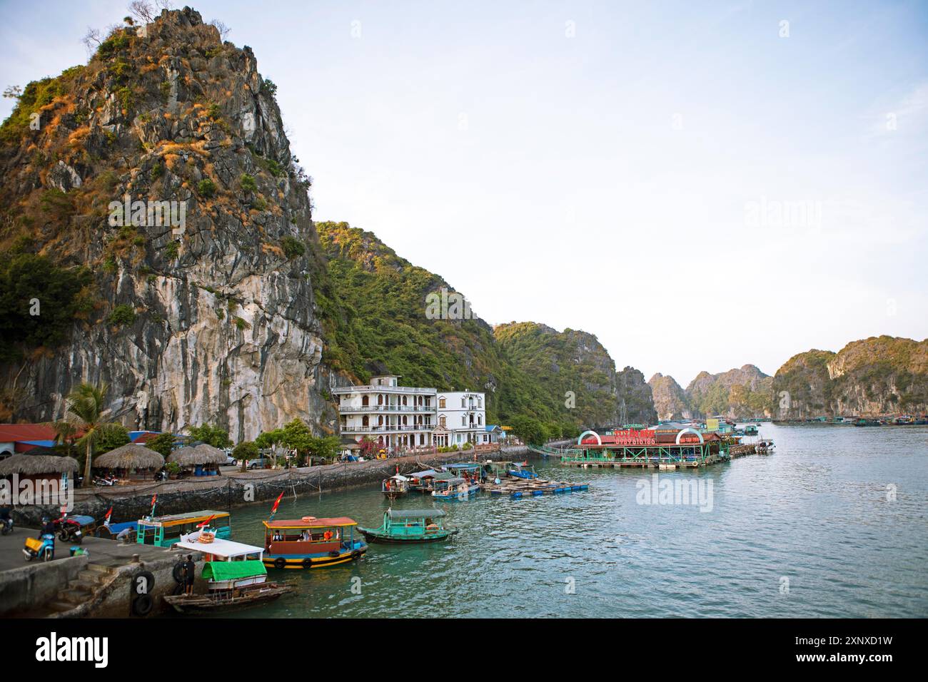 Ben Beo boat angler and the karst rocks in Lan Ha Bay, Halong Bay ...