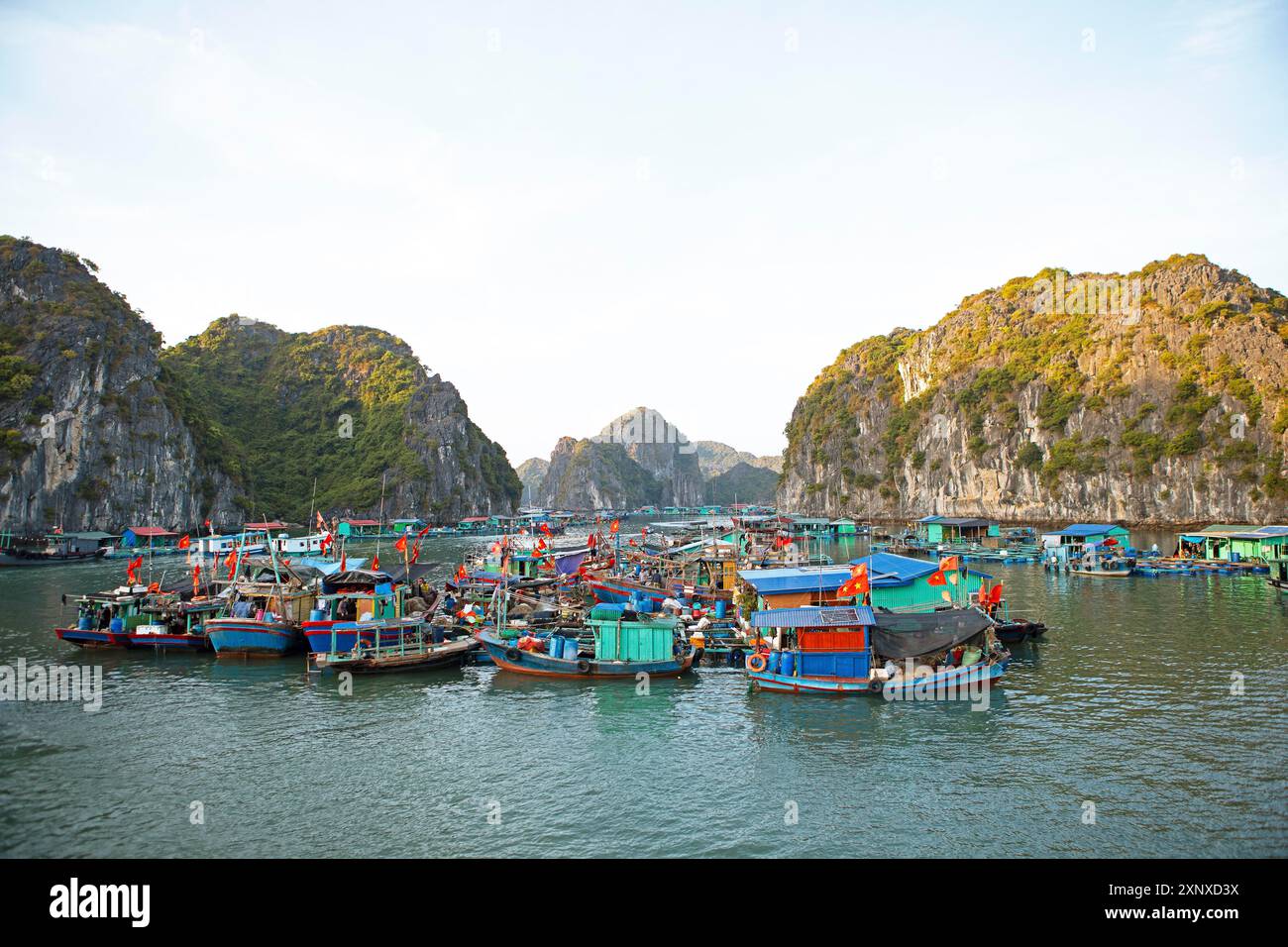 Floating fishing village of Cai Beo and karst rocks in Lan Ha Bay ...