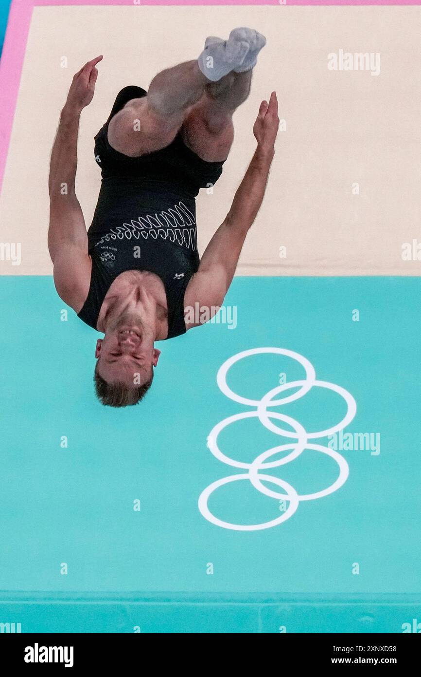 Dylan Schmidt of New Zealand competes during the men's trampoline ...