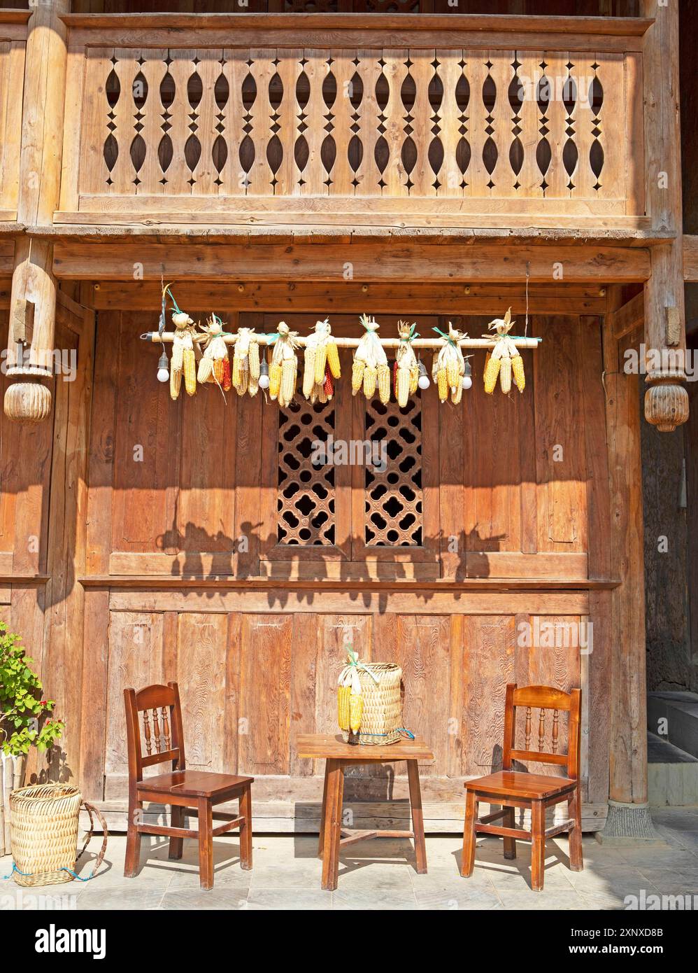 Corn on the corn cob hanging from a traditional house, Pa Vi Hmong ...