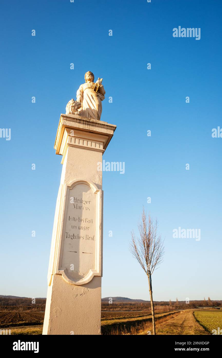 Column with saint marcus statue in burgenland Stock Photo - Alamy