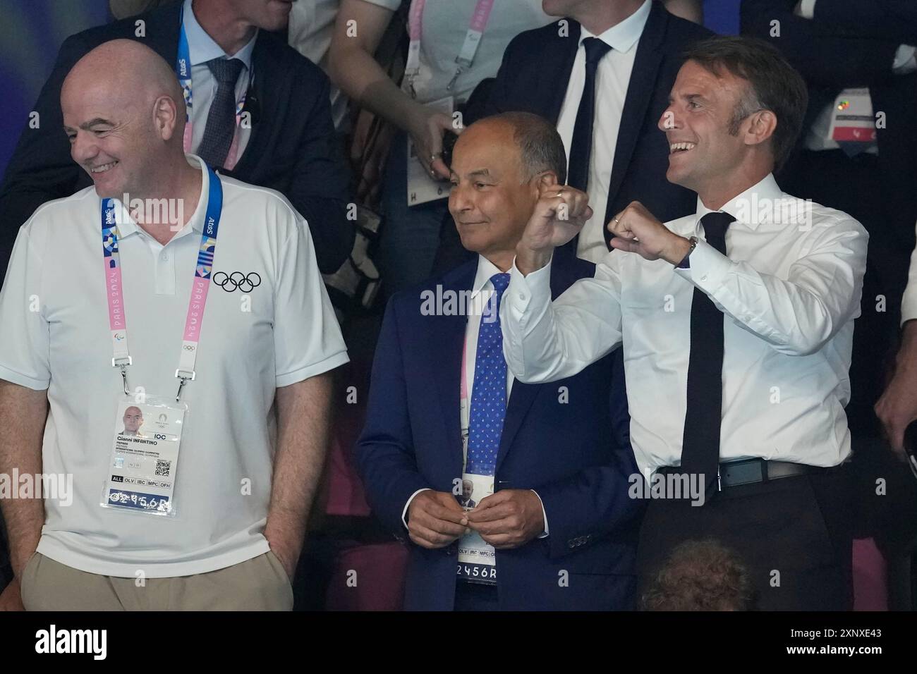 French President Emmanuel Macron gestures to the crowd as he arrives at ...